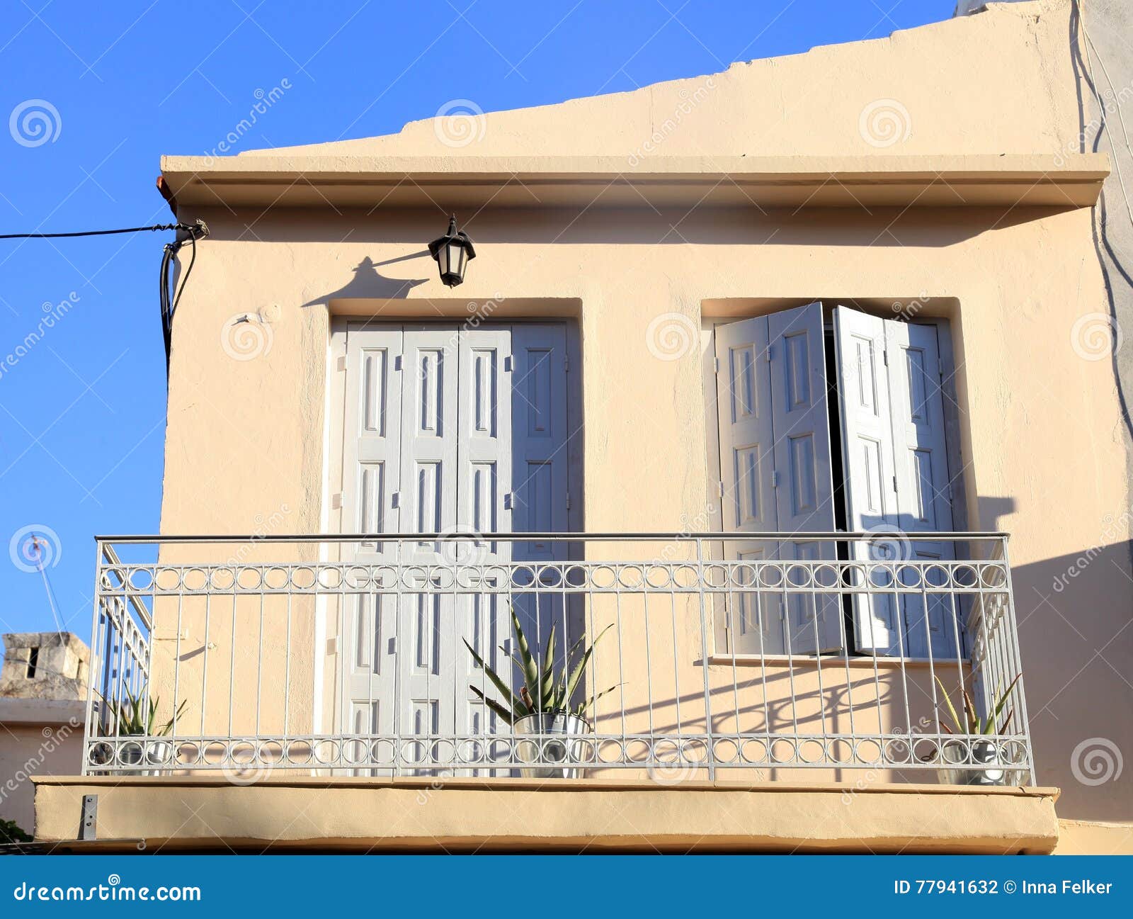 Balcony with Shutter Windows in an Old House, Greece Stock Photo ...