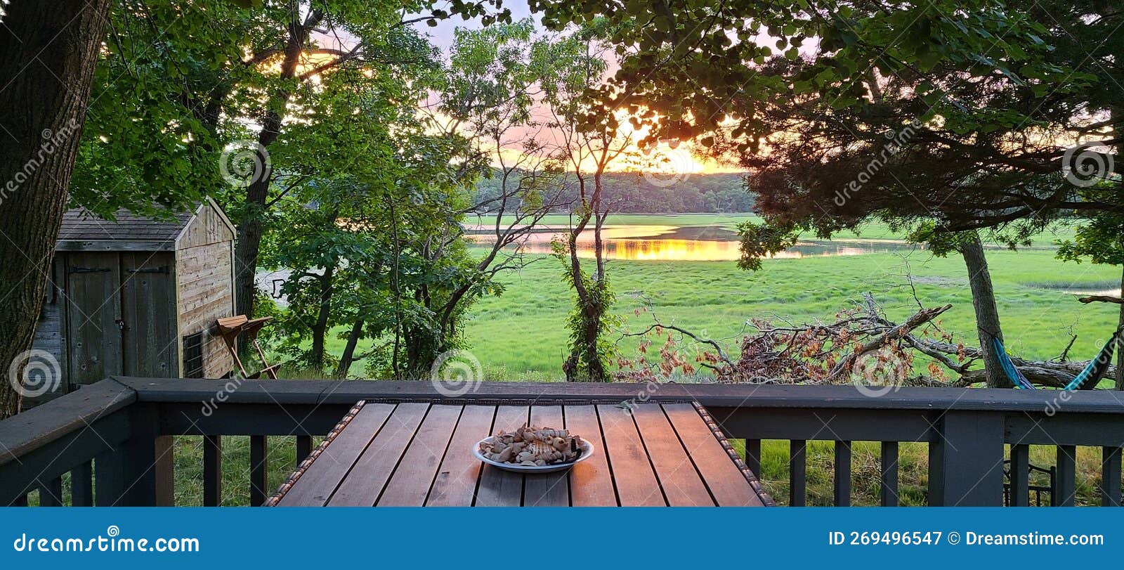 Balcony sunset stock image. Image of backyard, river - 269496547