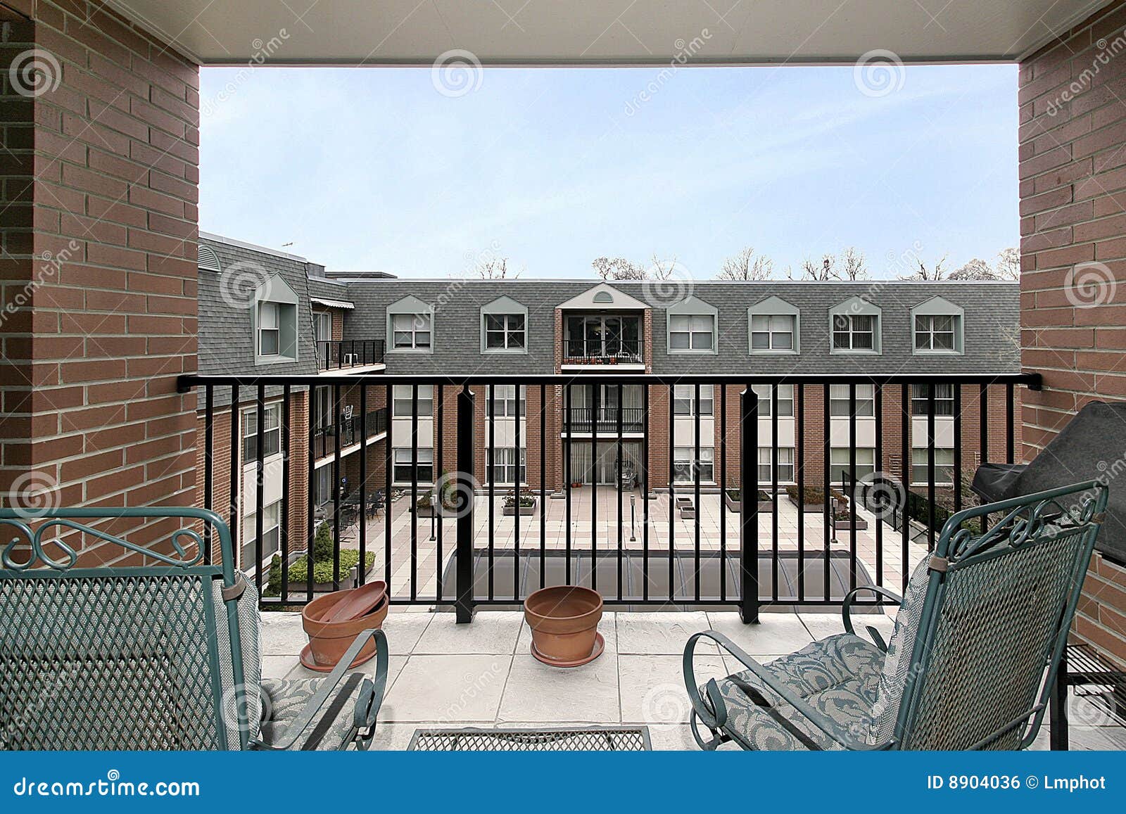 Balcony view of courtyard stock photo. Image of investment - 8904036