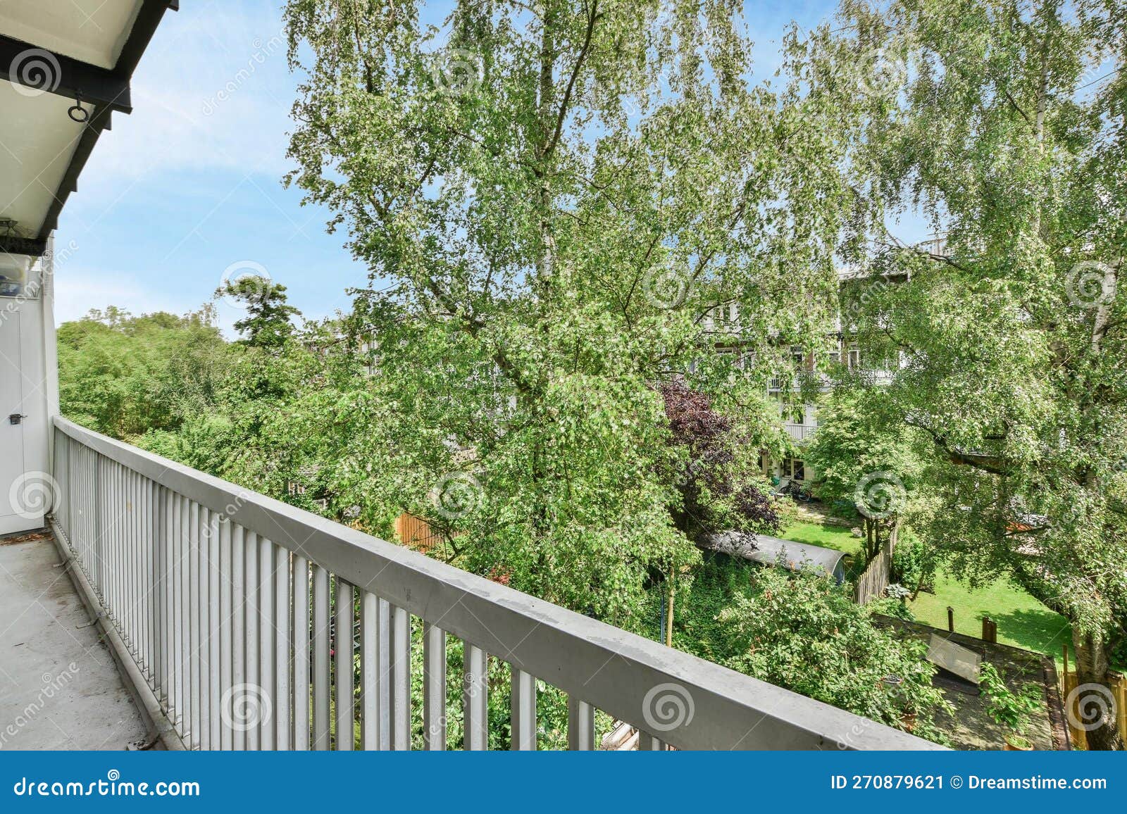A Balcony with a View of Trees and a Yard Editorial Photo - Image of ...