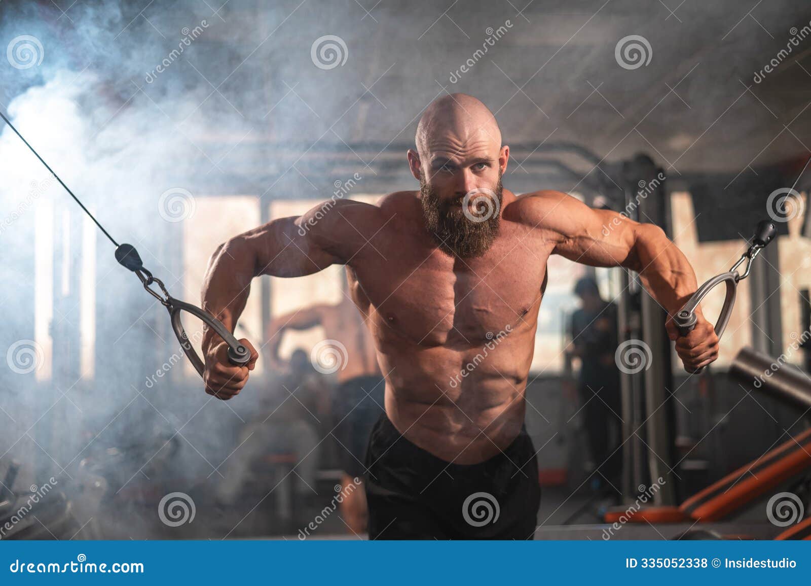 Bald Caucasian Bodybuilder Training Chest Using Cable Crossover in Gym ...