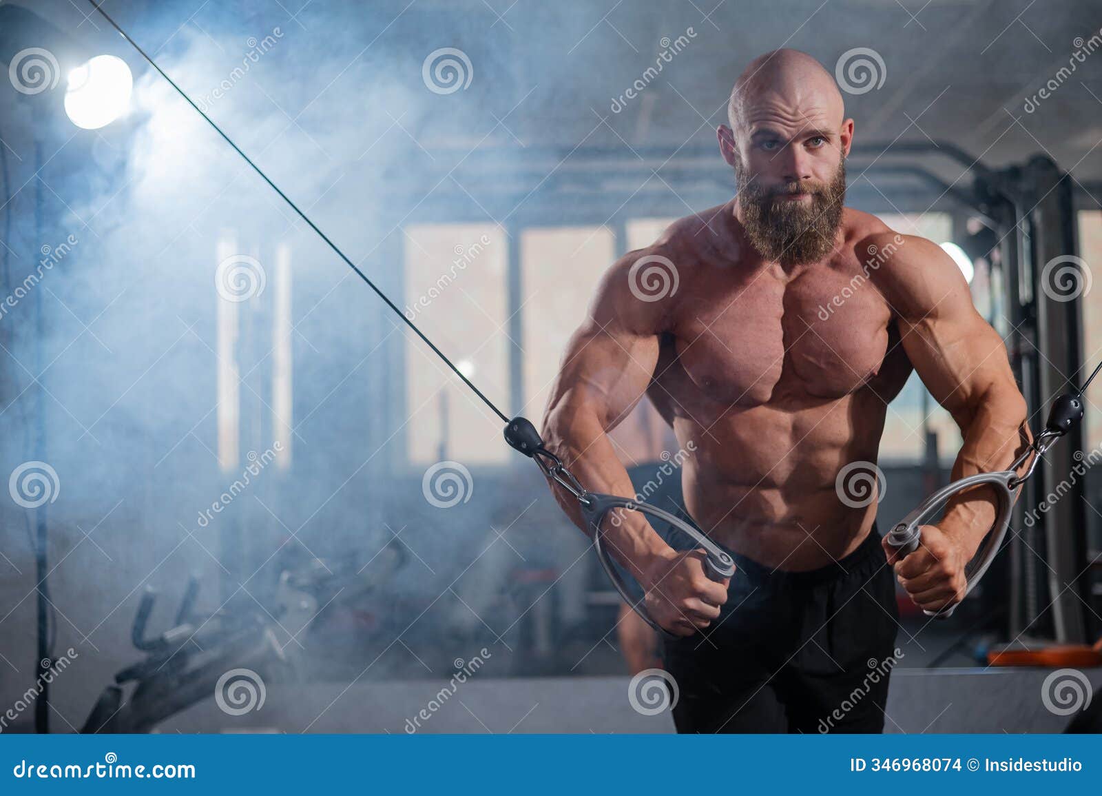 Bald Caucasian Bodybuilder Training Chest Using Cable Crossover in Gym ...