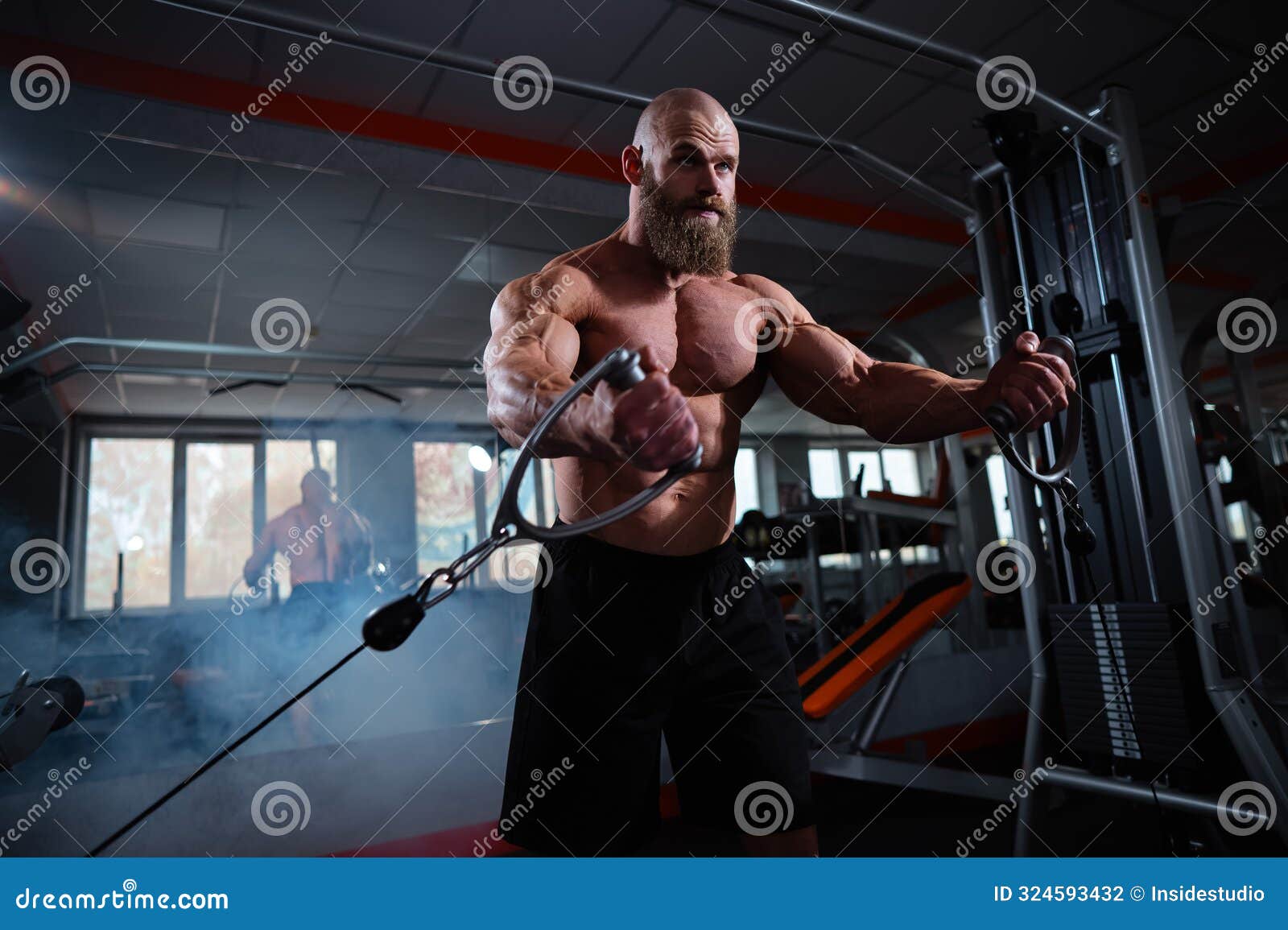 Bald Caucasian Bodybuilder Training Chest Using Cable Crossover in Gym ...