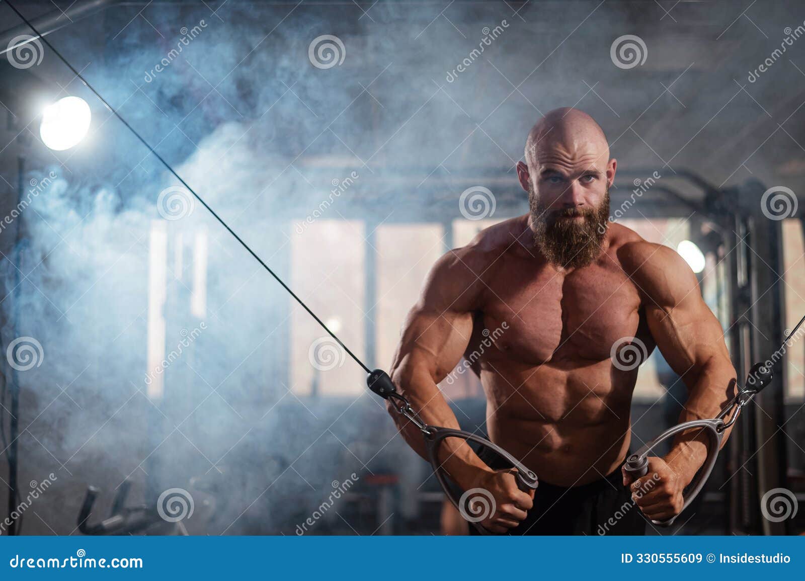 Bald Caucasian Bodybuilder Training Chest Using Cable Crossover in Gym ...