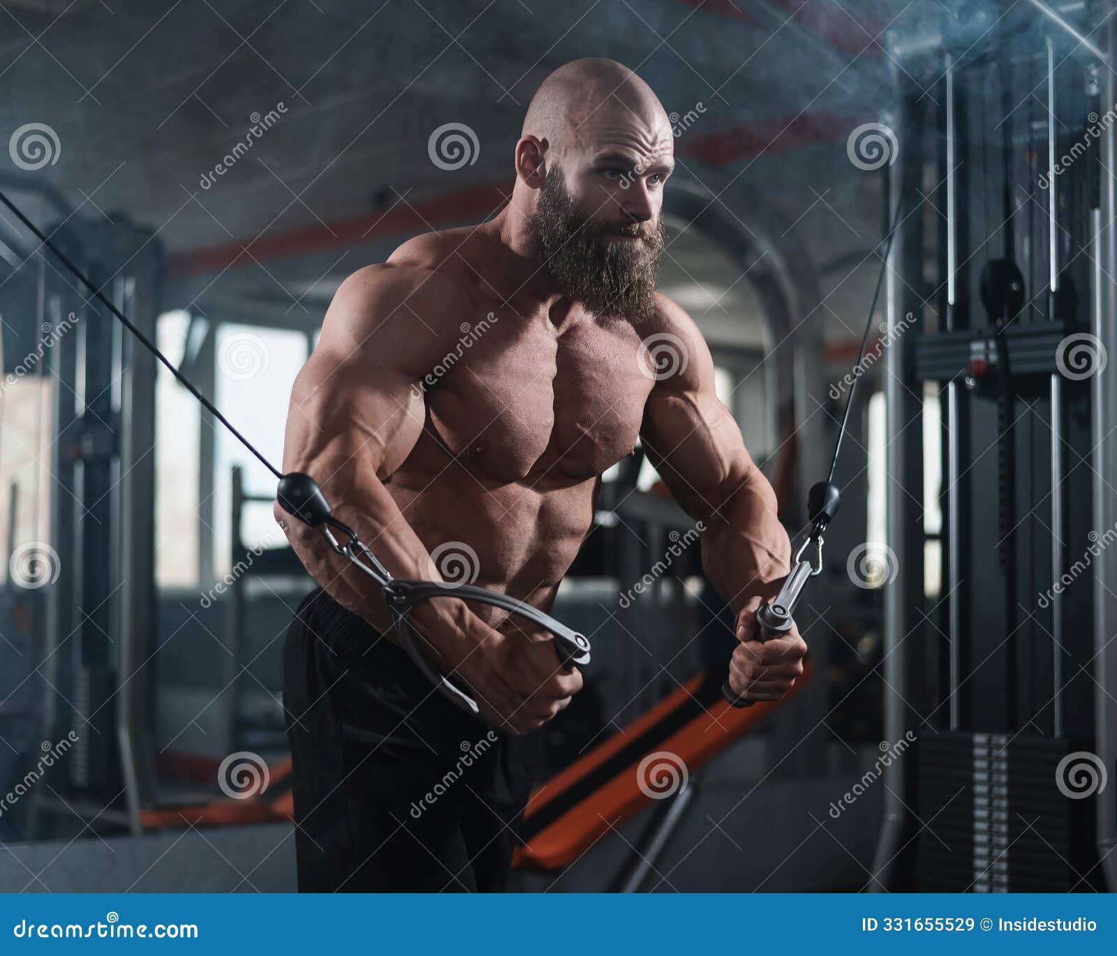 Bald Caucasian Bodybuilder Training Chest Using Cable Crossover in Gym ...