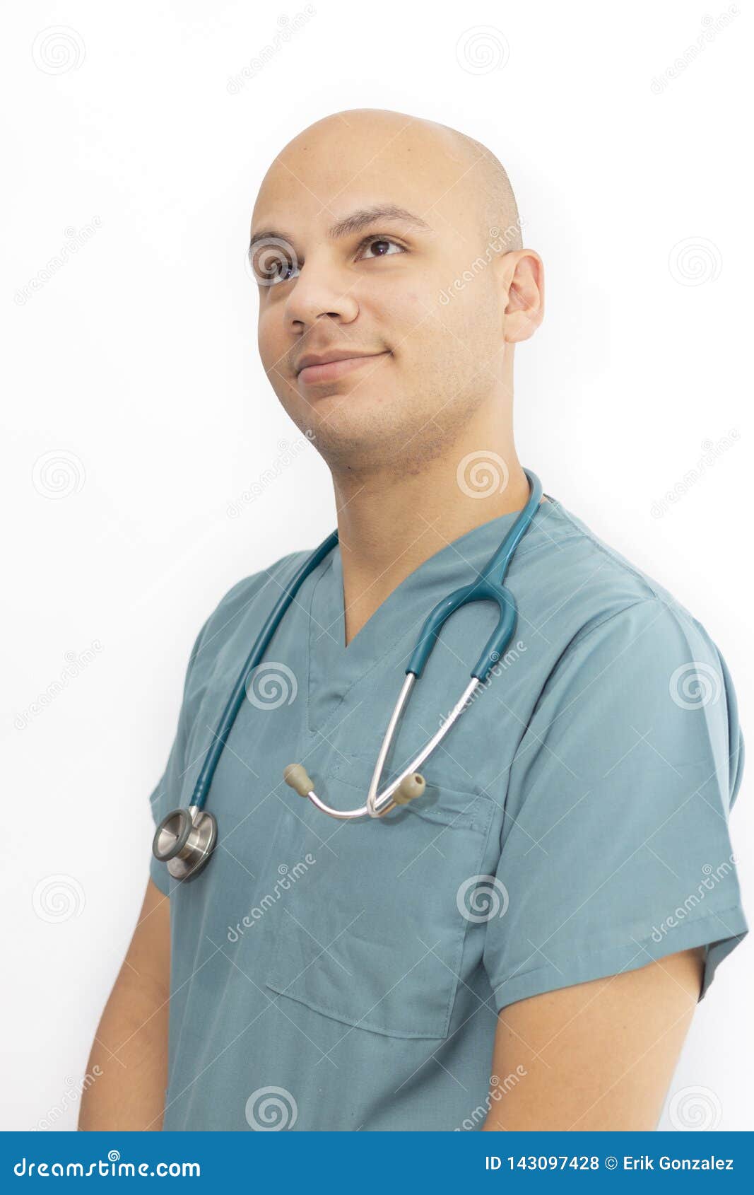 Bald Doctor with Medical Scrubs Stock Photo - Image of hand, dark ...