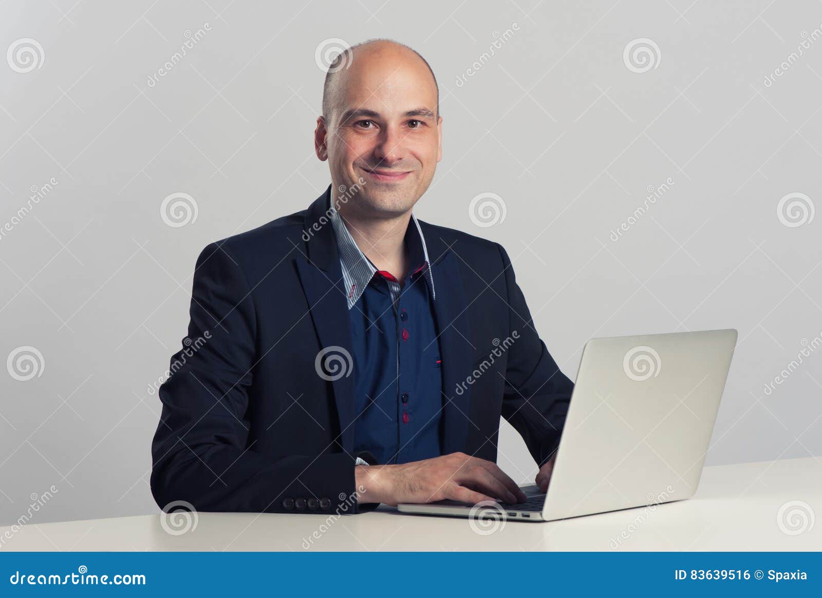 Bald Guy Works on His Laptop Computer Stock Photo - Image of caucasian ...