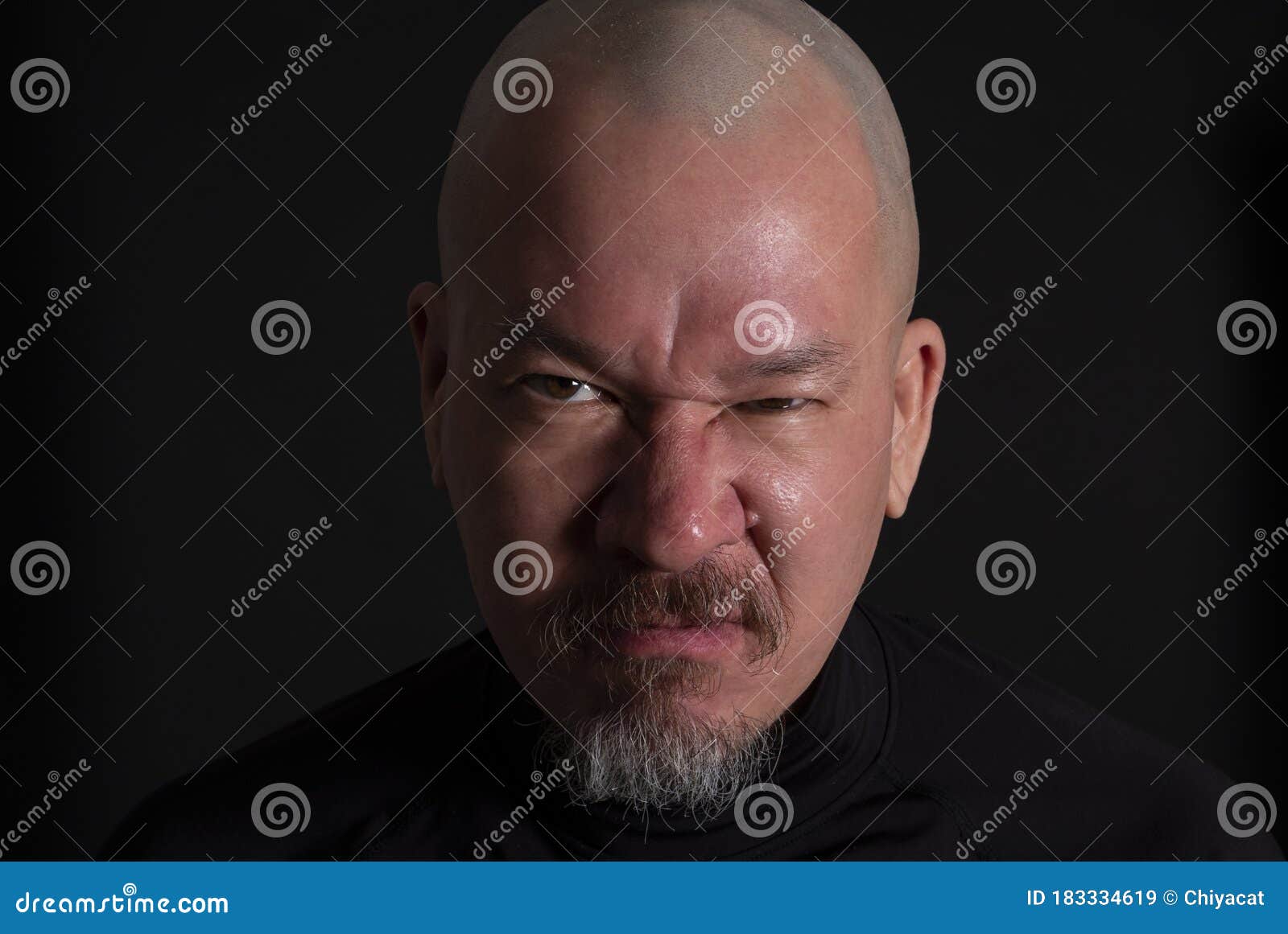 A Bald Man with Beard and an Angry Expression on His Face #2 Stock ...