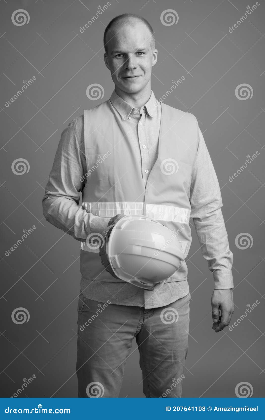 Bald Man Construction Worker Against Gray Background Stock Photo ...