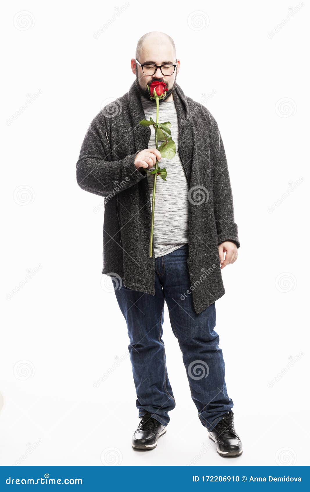 A Bald Man Holds a Red Rose in His Hands. Vertical Stock Photo - Image ...