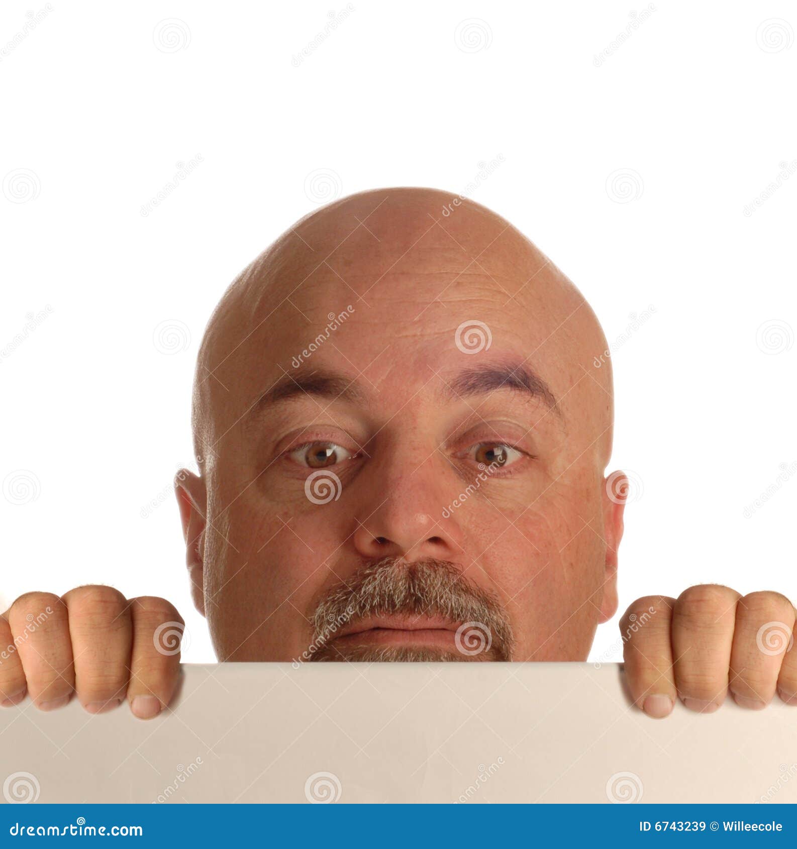 Bald man looking over sign stock image. Image of billboard - 6743239