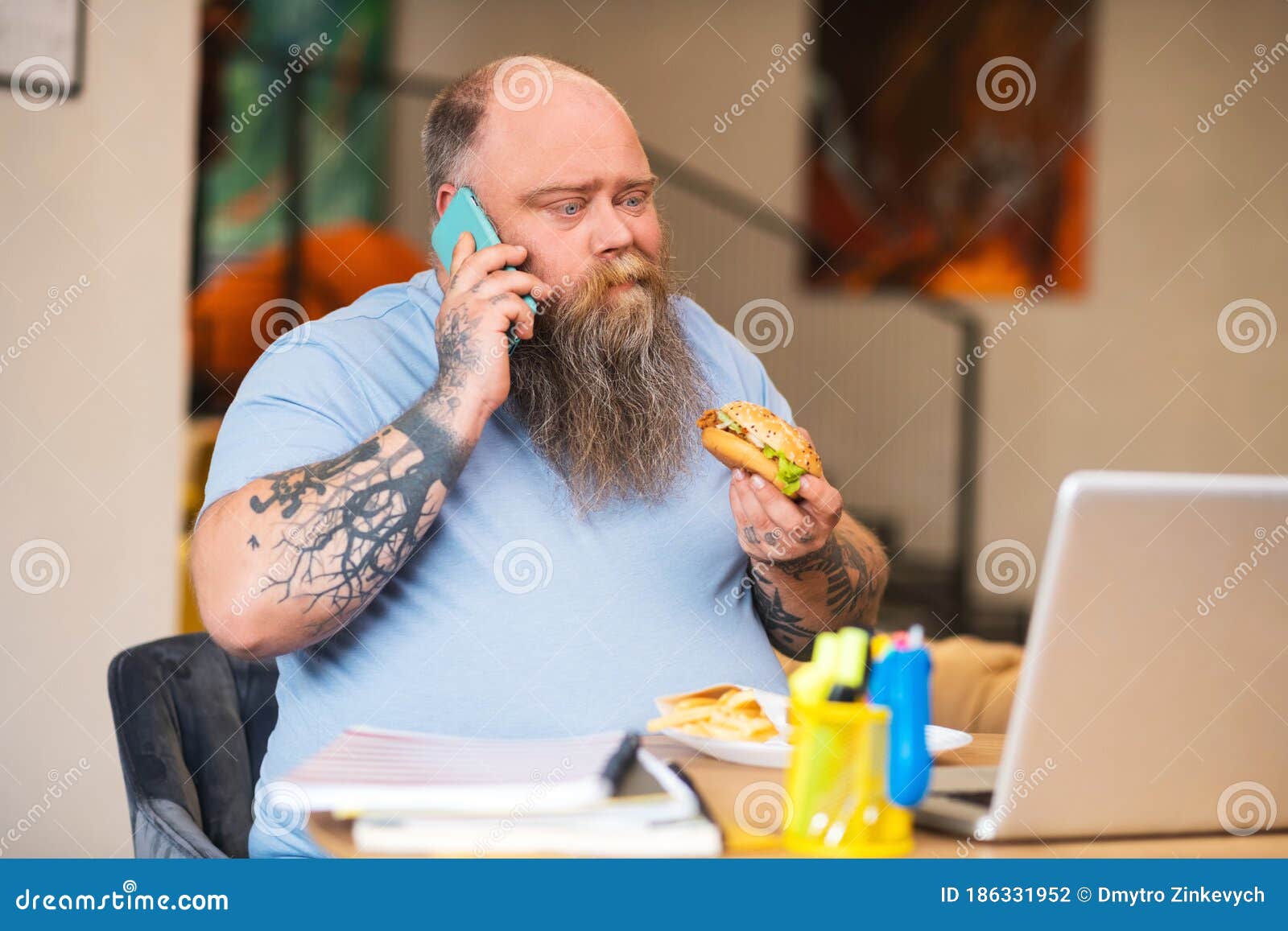 Bald Man Talking on the Phone and Chewing a Burger Stock Photo - Image ...