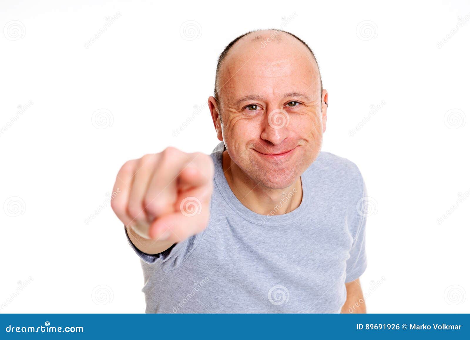 Baldheaded Man Pointing in To the Camera and Smiling Stock Photo ...