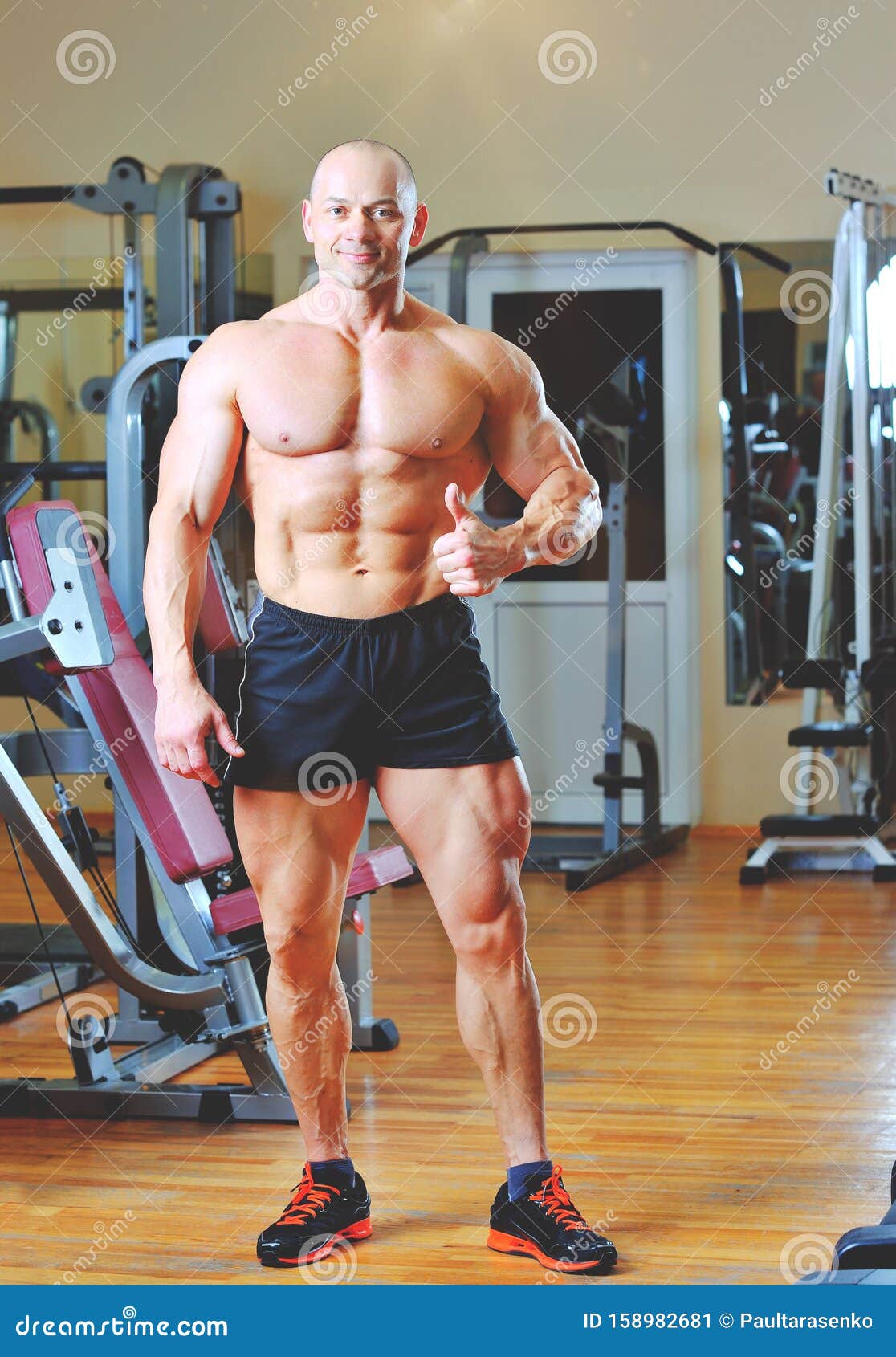 Bale Bodybuilder Showing Thumbs Up in Gym Stock Image - Image of body ...