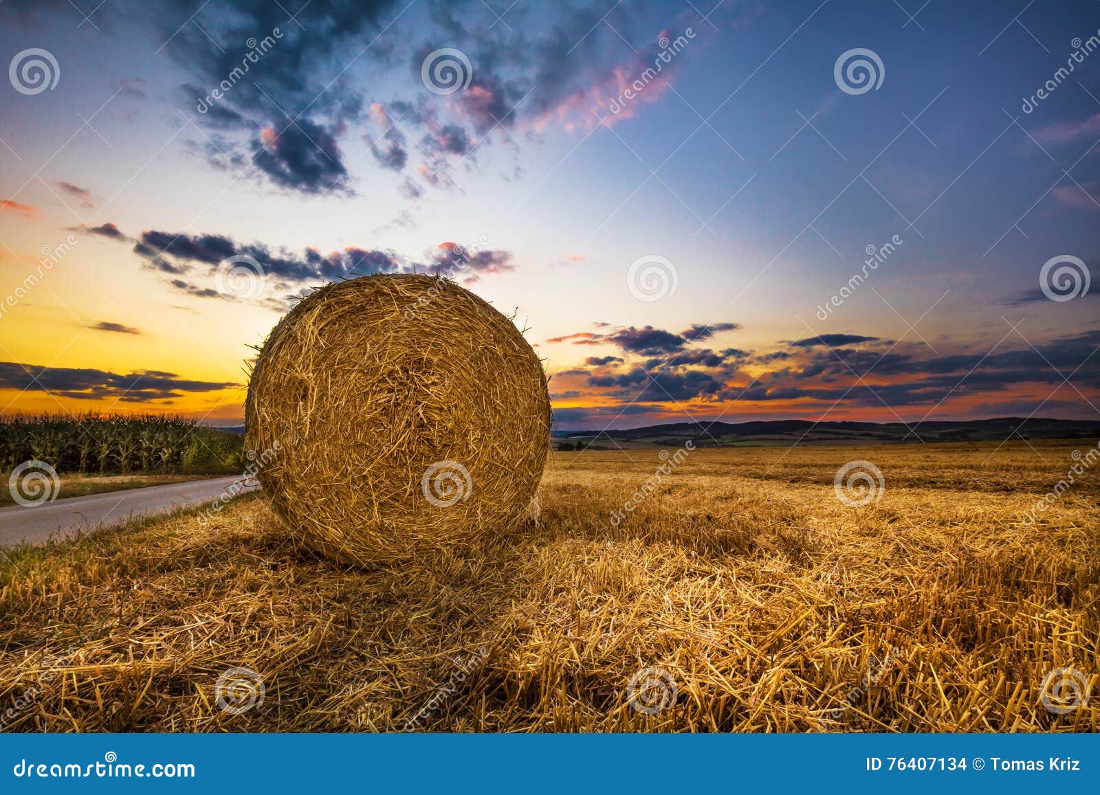 Bale of Hay on the Field and Sunset Stock Photo - Image of power, rural ...