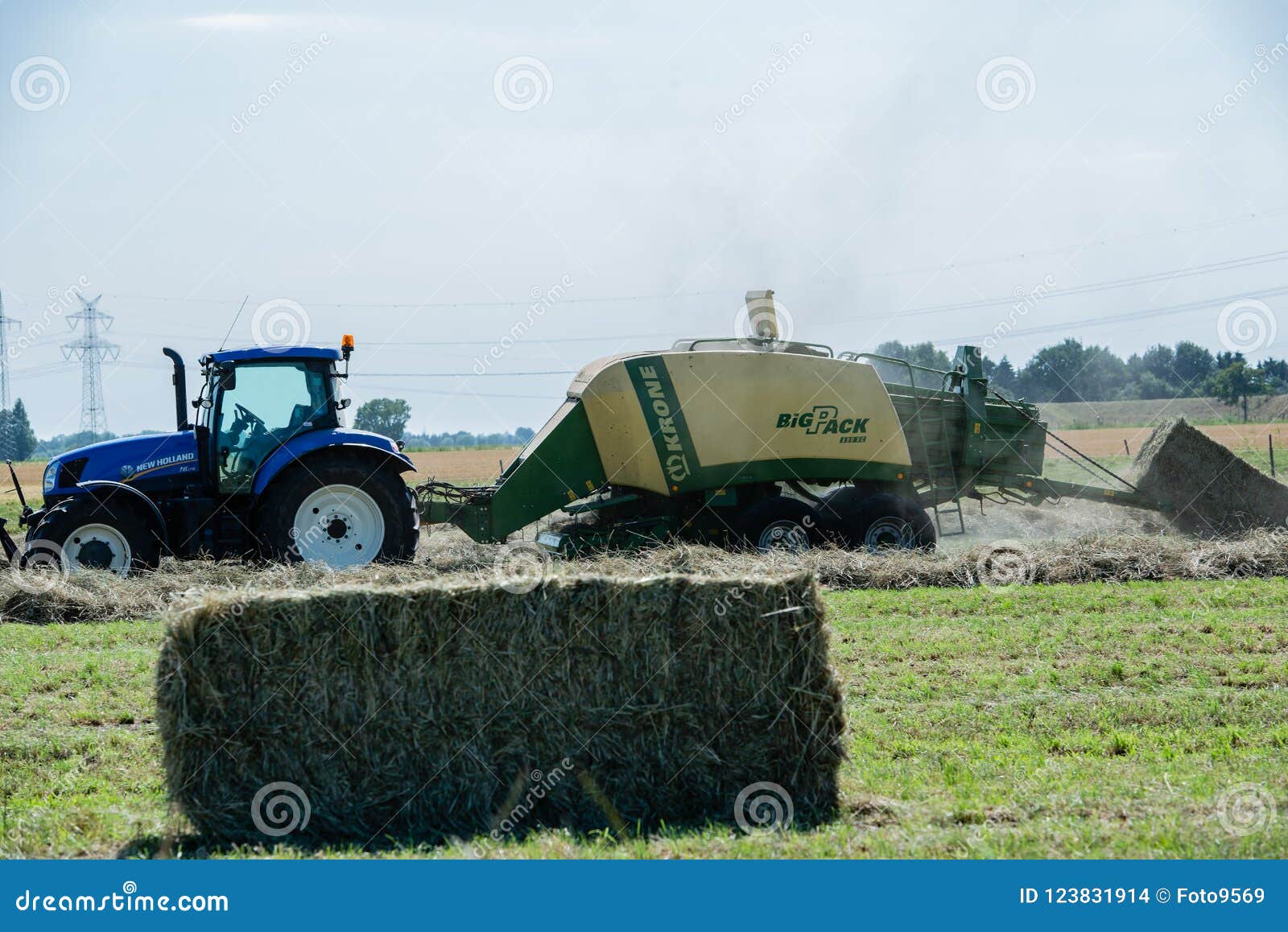 Baler at the haymaking editorial stock image. Image of grain - 123831914