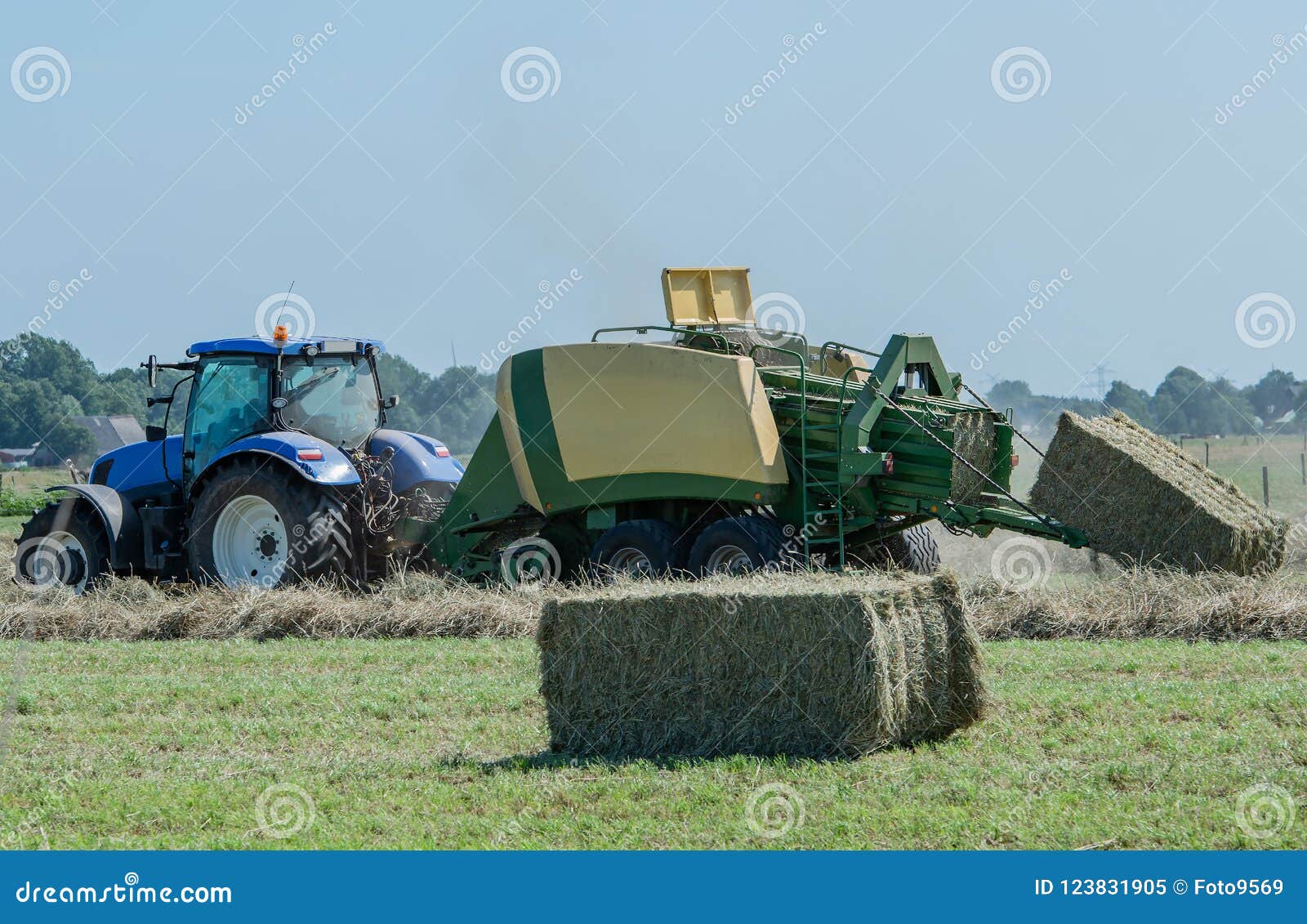 Baler at the haymaking stock image. Image of harvest - 123831905