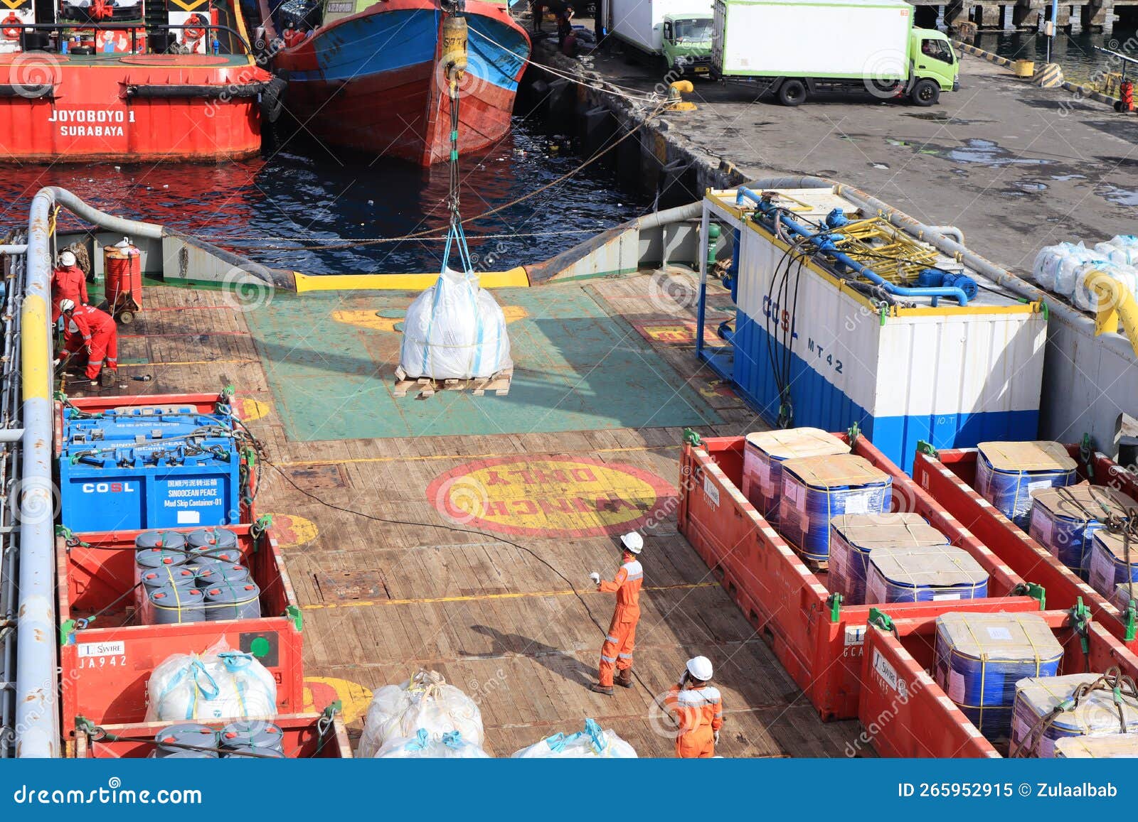 Banyuwangi, May 2022. Several Stevedores are Assisting the Process of ...