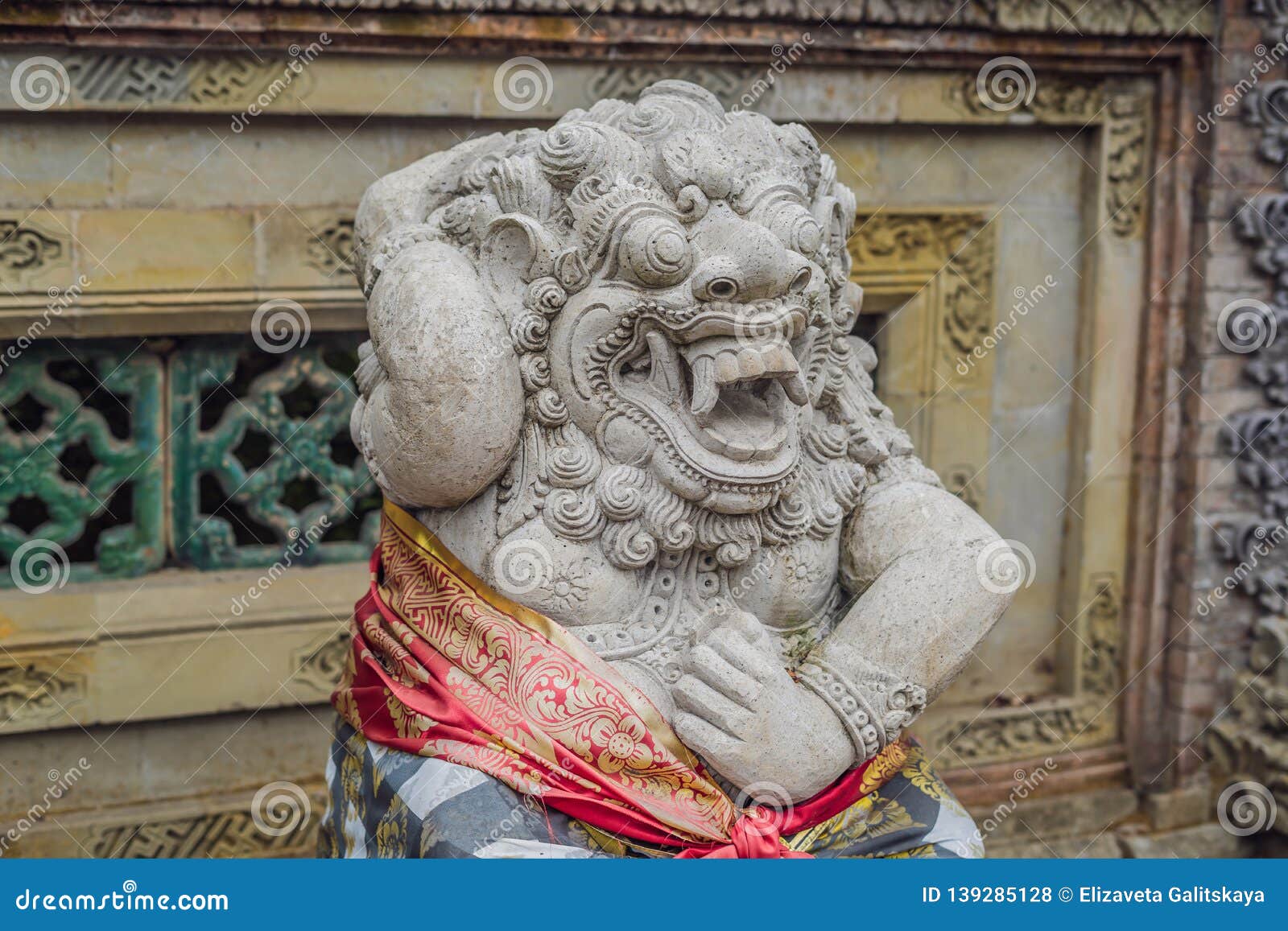 Balinese Demon Statue Dressed in a Sarong Stock Photo - Image of craft ...