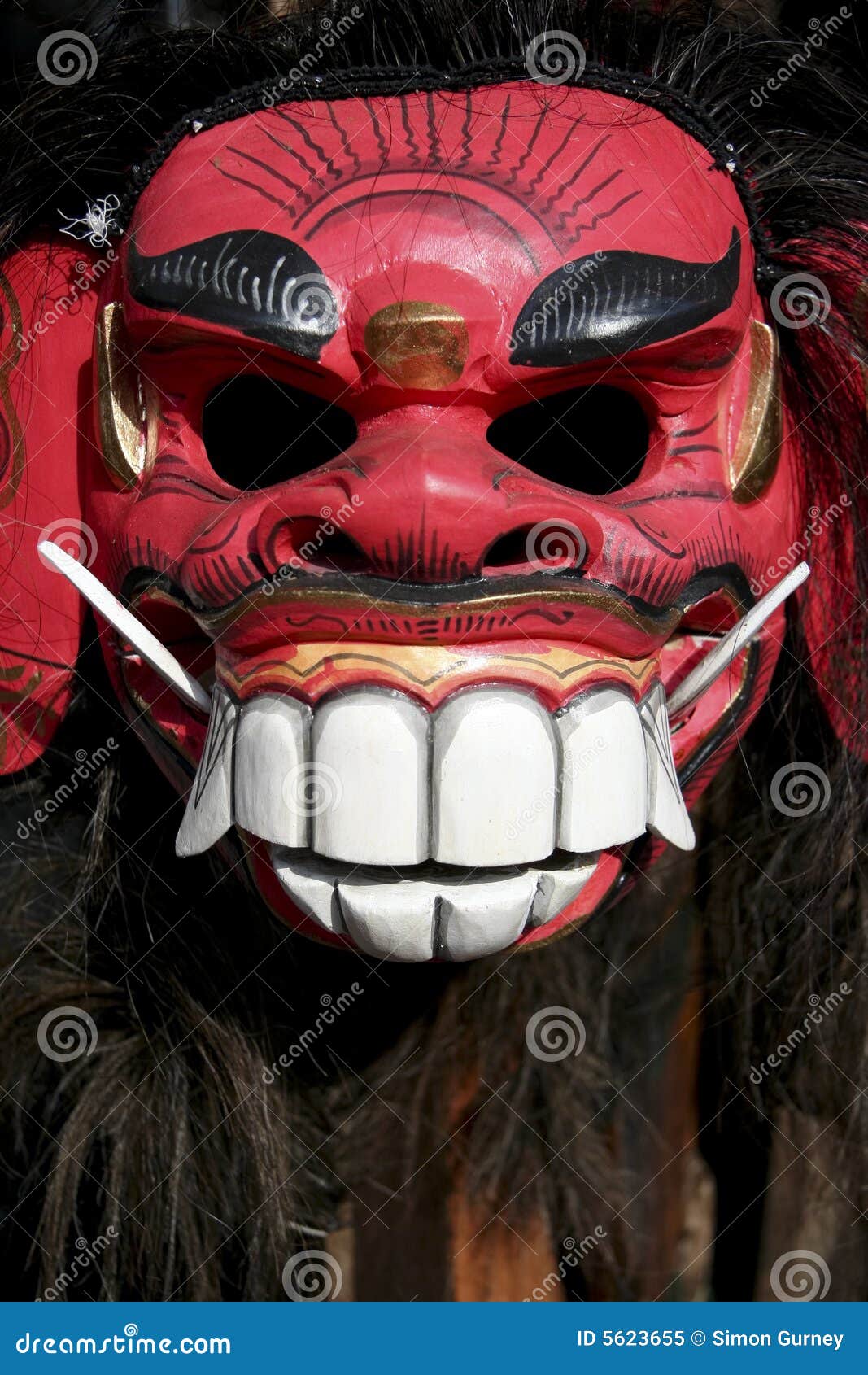 Balinese red demon mask stock image. Image of balinese - 5623655
