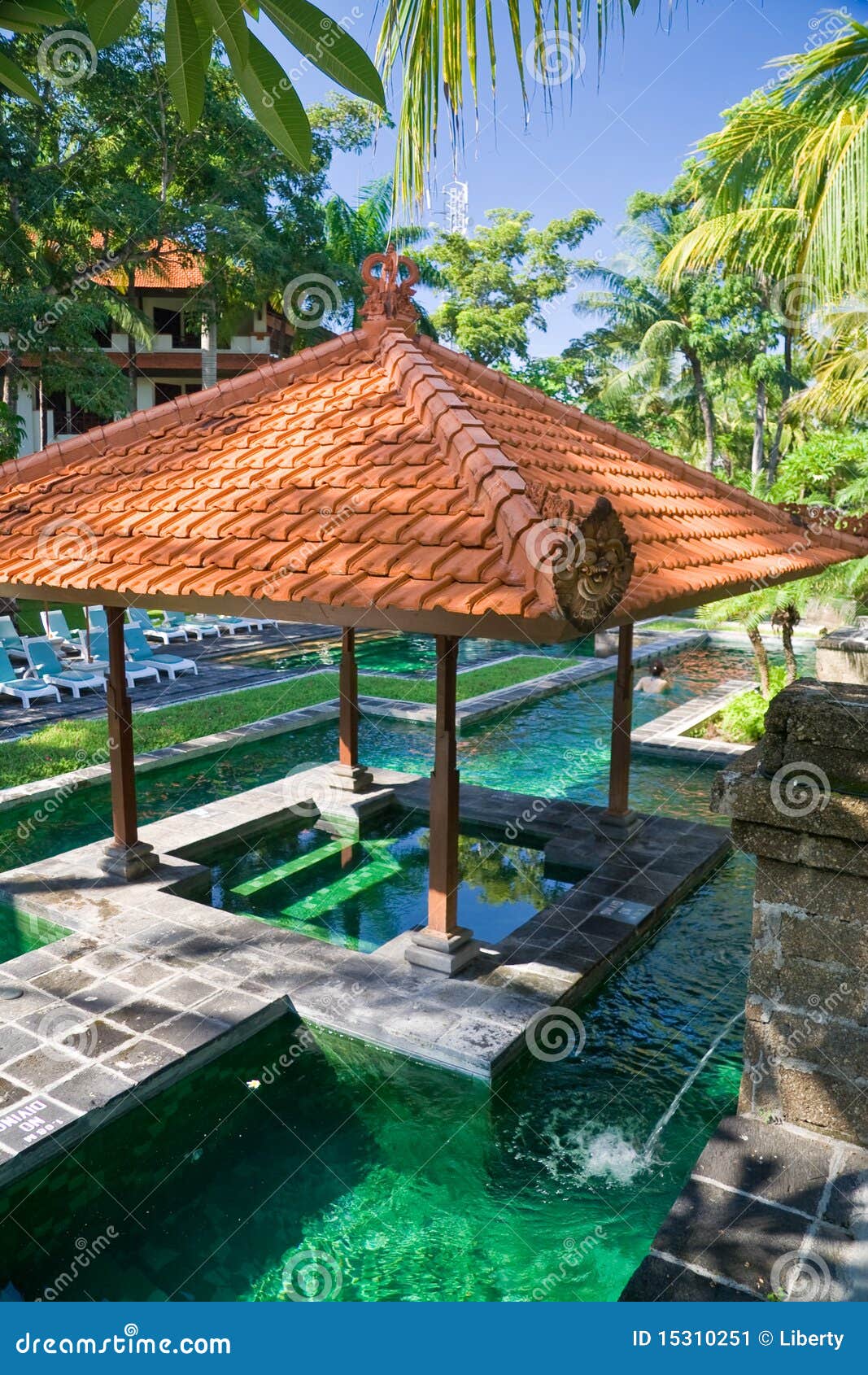 Balinese swimming pool stock image. Image of rainforest - 15310251