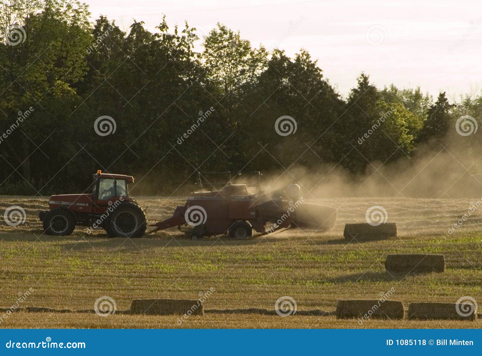 Baling hay stock photo. Image of farmland, farm, hayfield - 1085118