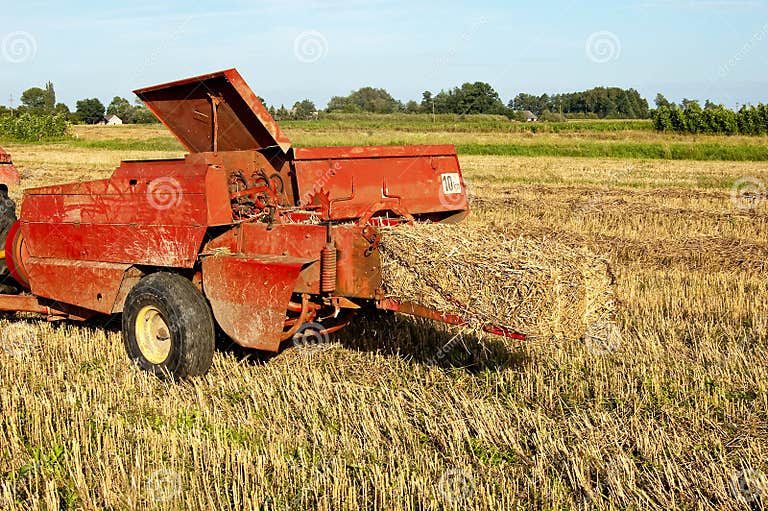 Baling hay in filed stock image. Image of farm, baled - 20859435