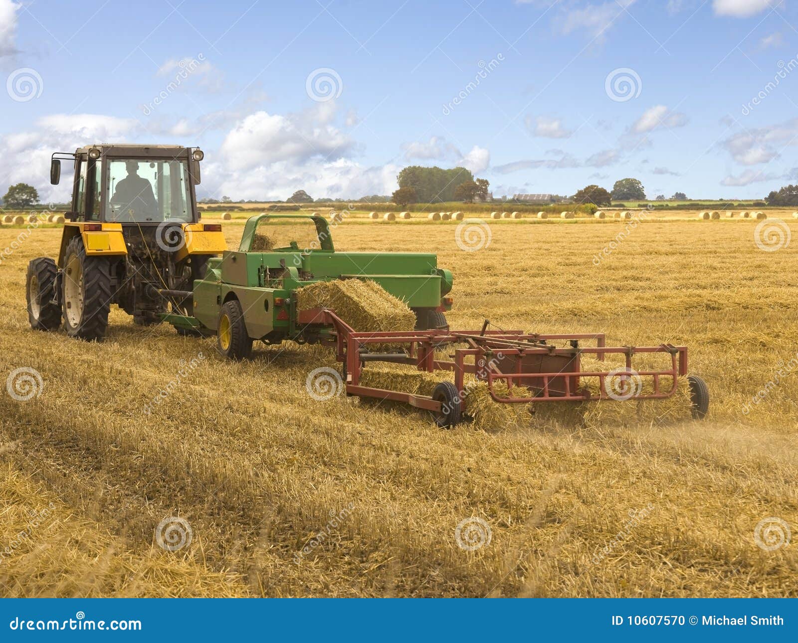 Baling machine and tractor stock photo. Image of summer - 10607570