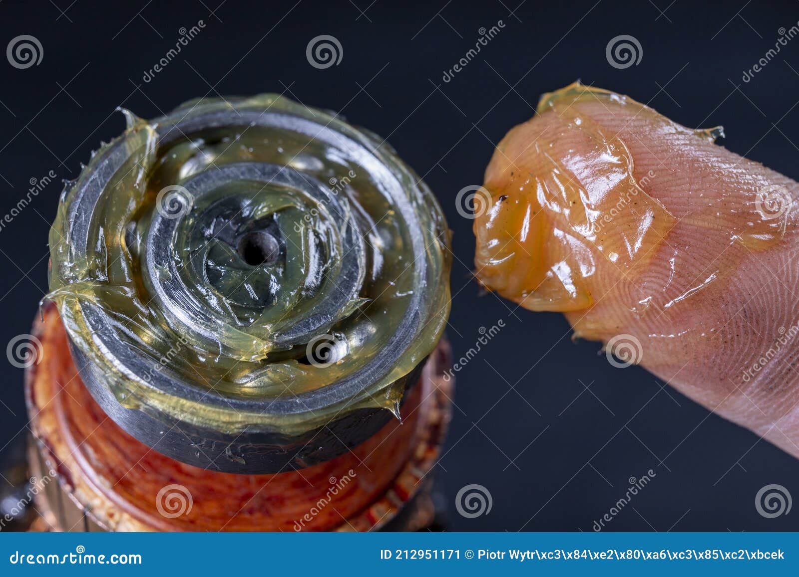 Ball Bearing Lubrication with Grease. Assembly Work in a Mechanical ...