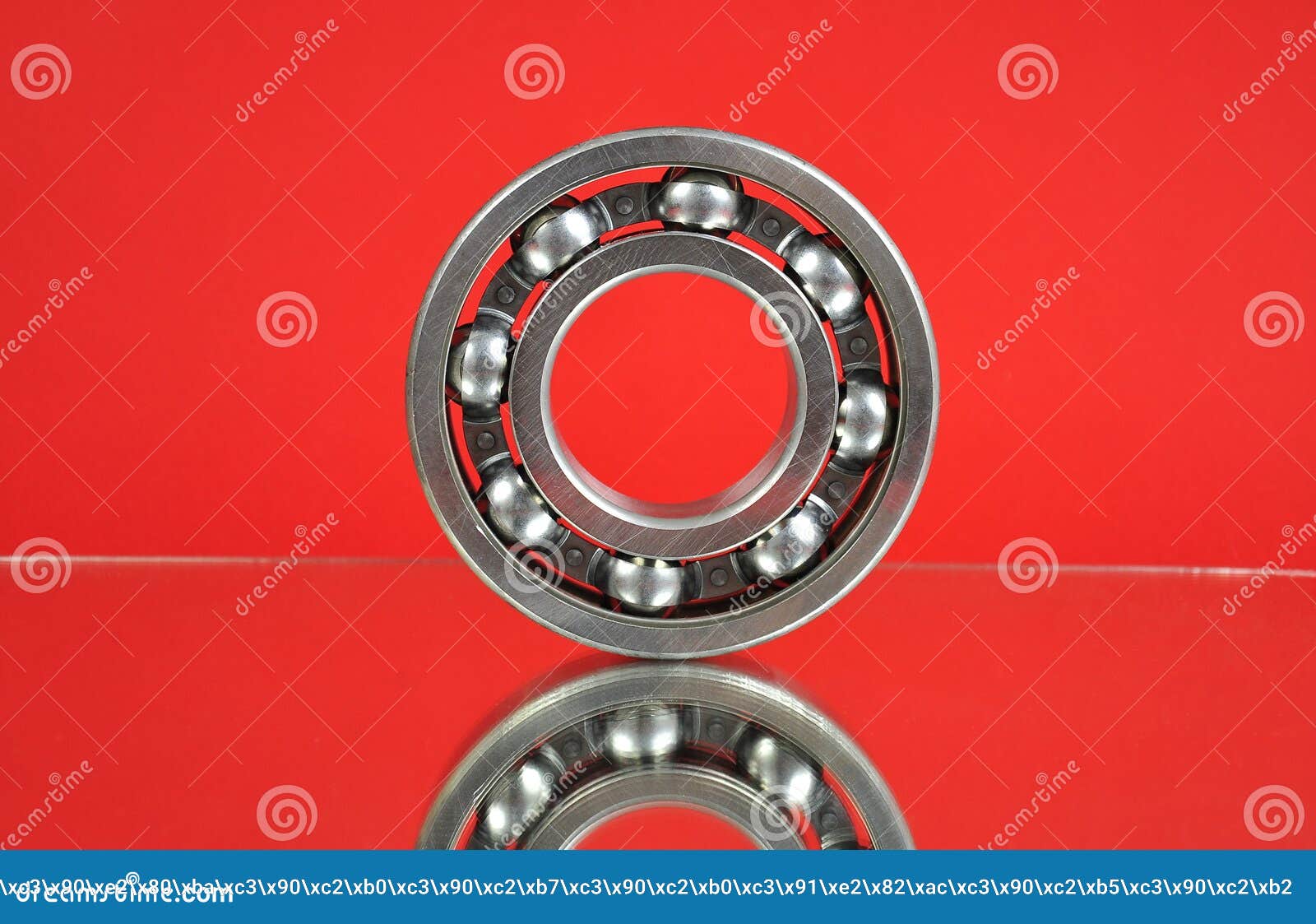 Ball Bearing on a Mirror Surface. Stock Photo - Image of engineering ...