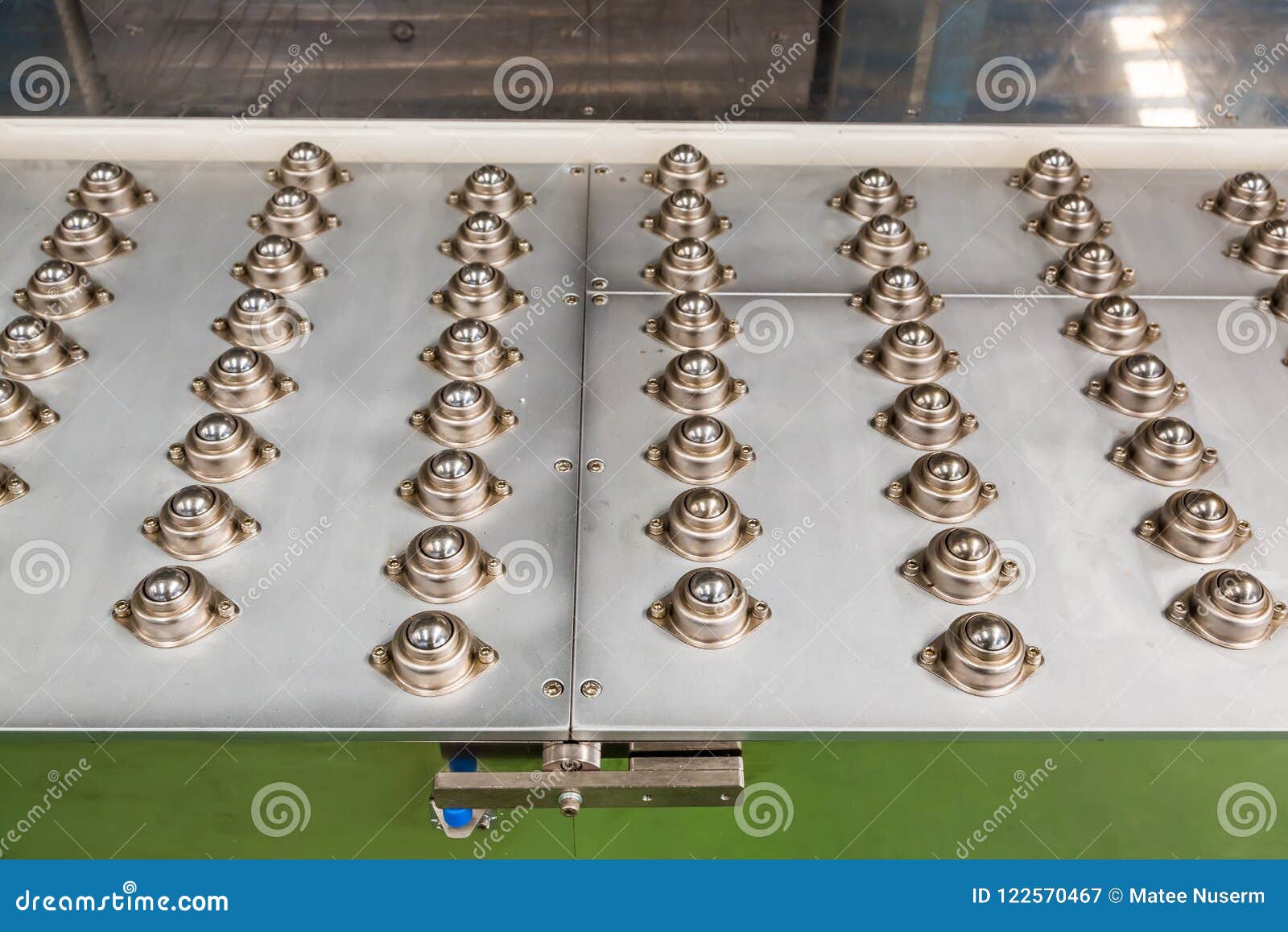 Ball rollers conveyor stock image. Image of movement - 122570467