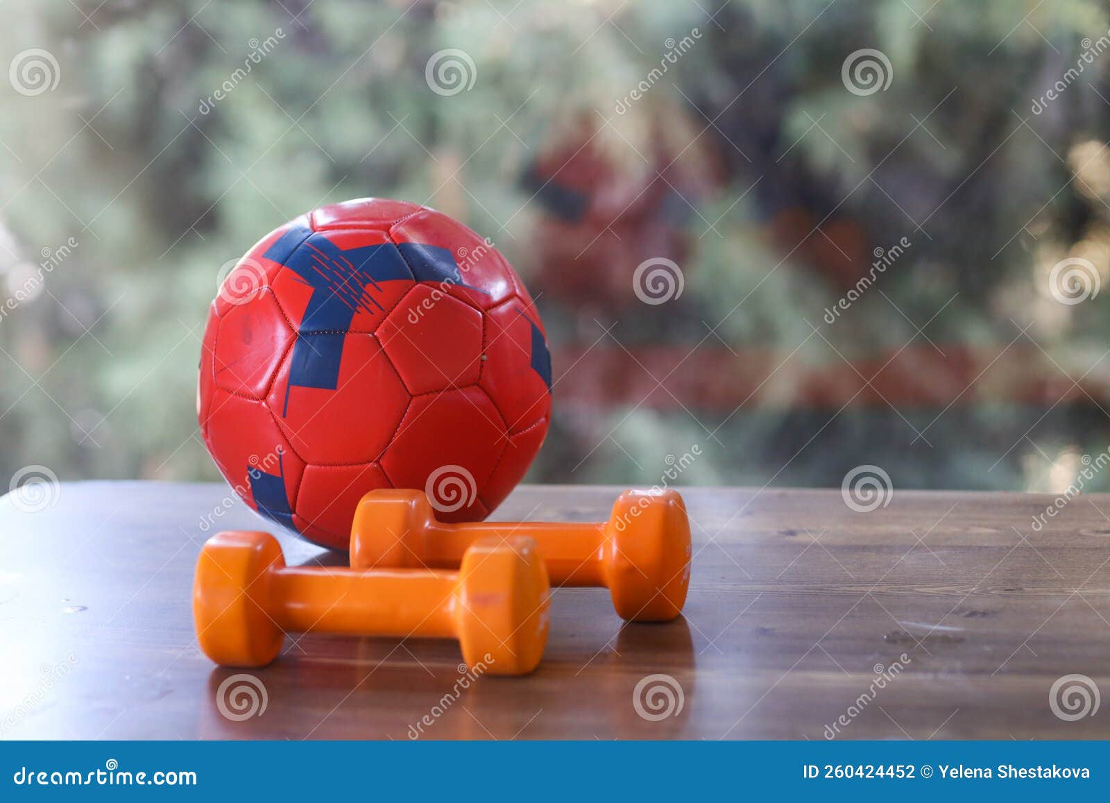 Ball and dumbbells stock photo. Image of player, orange - 260424452