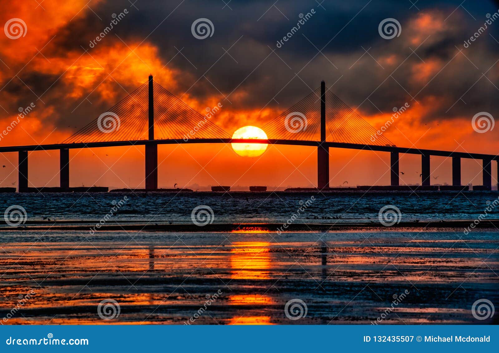 Ball of Fire at Skyway Bridge Stock Image - Image of sunrise, sunshine ...