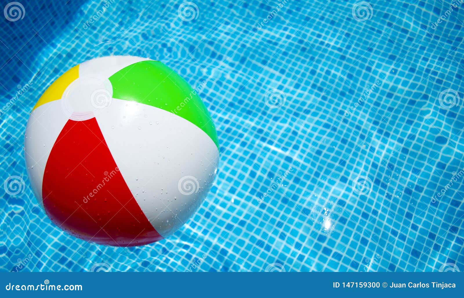 Ball Floating in a Blue Swimming Pool Stock Photo - Image of ...