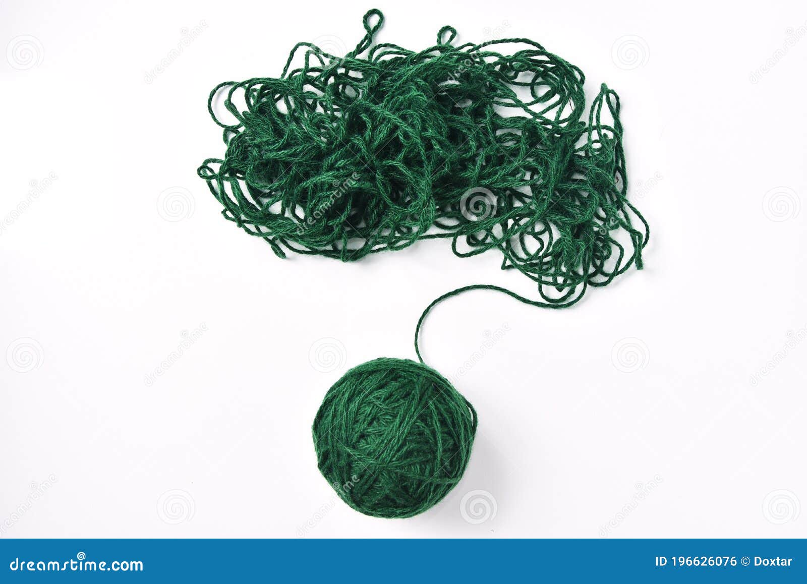 Ball of Green Thread and Tangled Threads on a White Background Stock ...