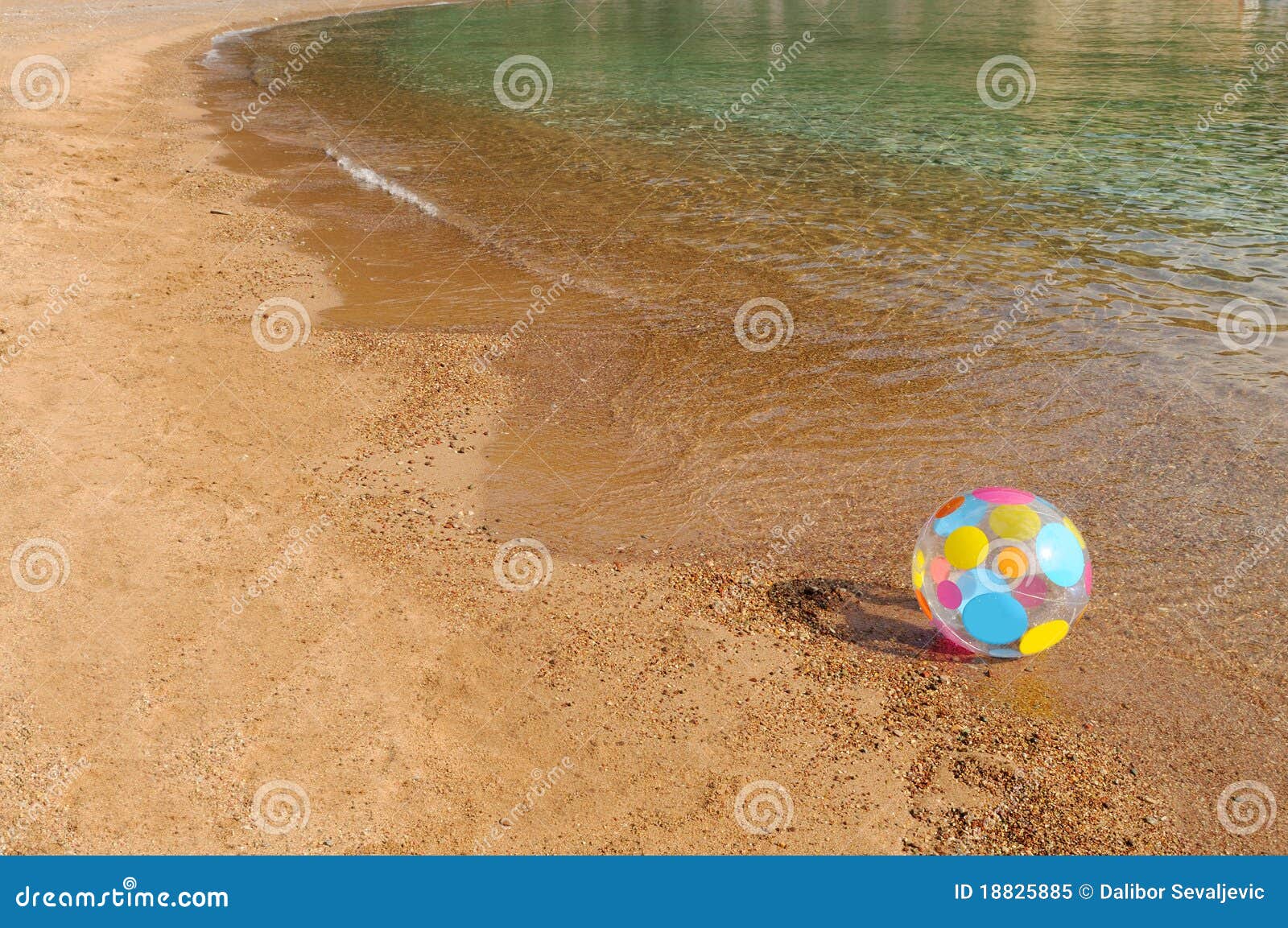 Ball on the huge beach stock image. Image of colourful - 18825885