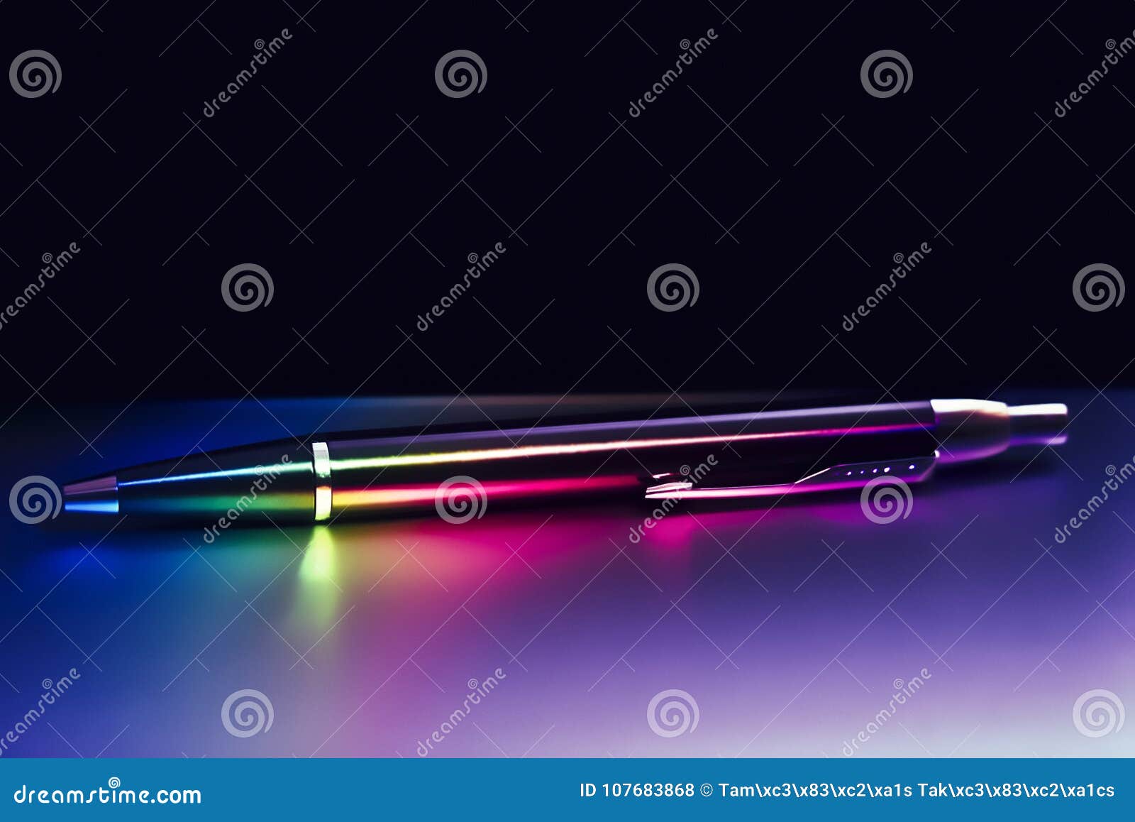 Ball Pen Illuminated with Color Rainbow Light on Matt Surface, Stock ...