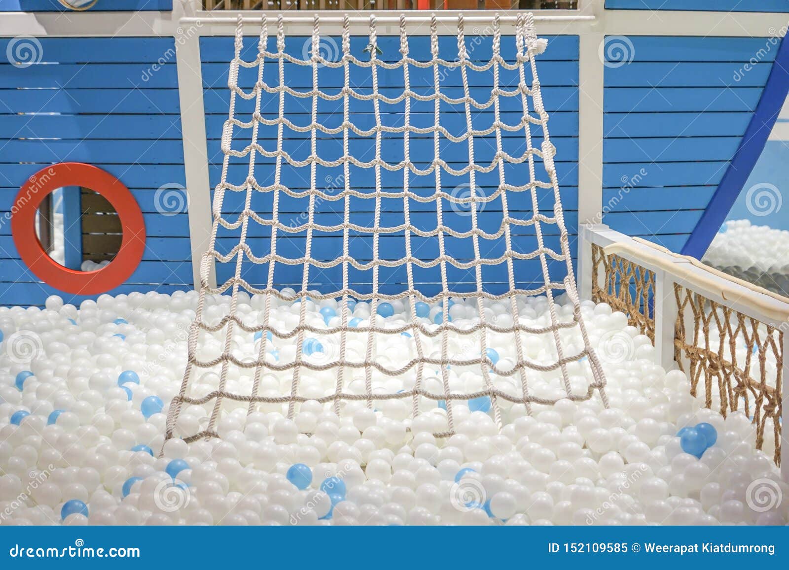Ball pit with climbing net stock image. Image of ballpit - 152109585