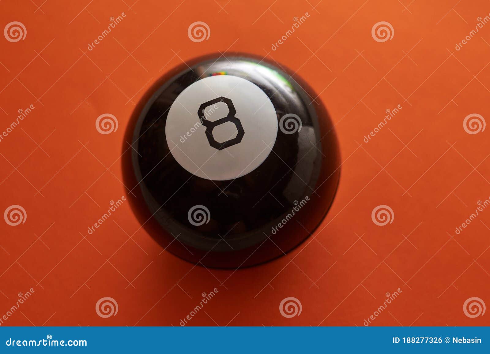The Ball of Predictions Figure Eight on an Orange Background Stock ...