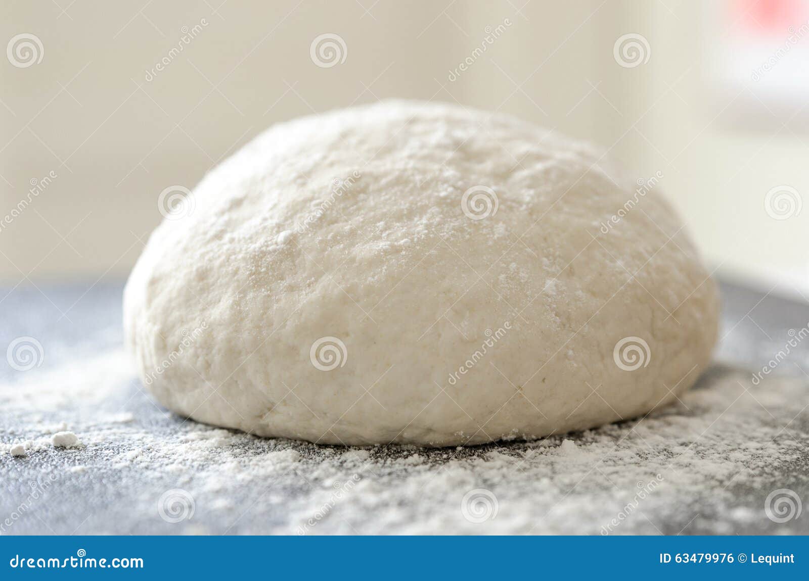 Ball of Rolled Flour Dough on Black Rolling Board Stock Photo - Image ...
