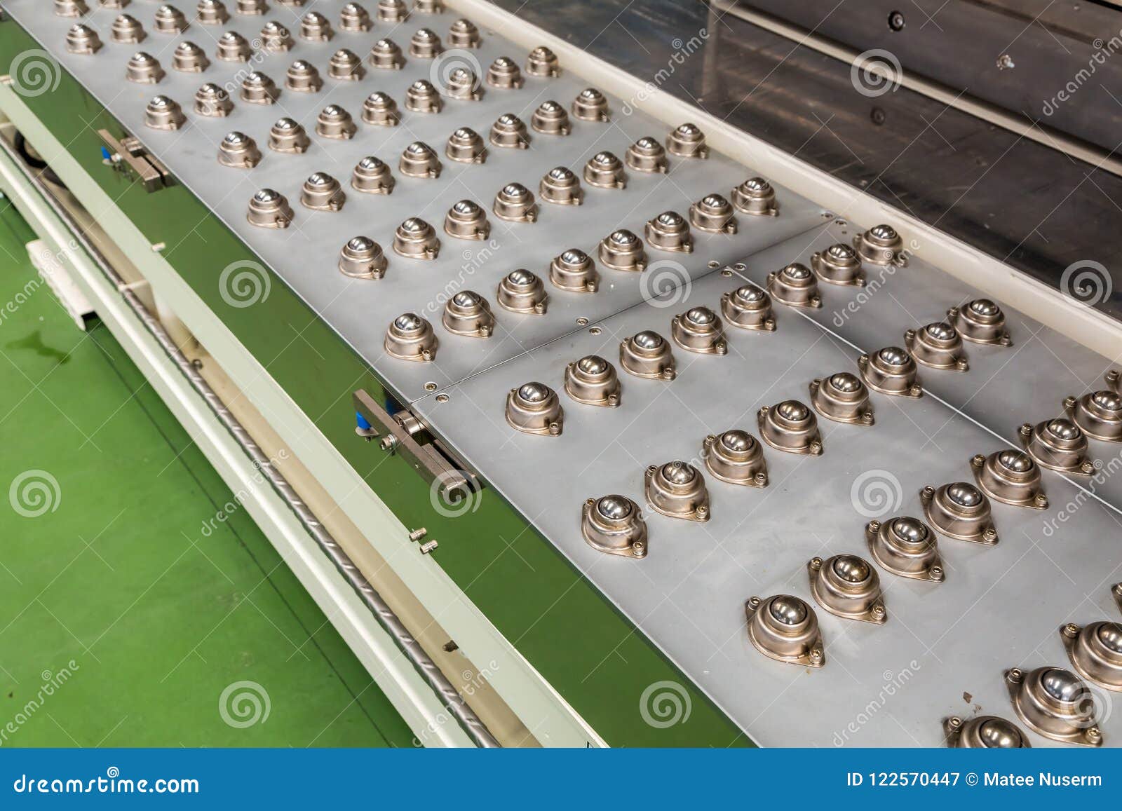Ball rollers conveyor stock image. Image of transportation - 122570447