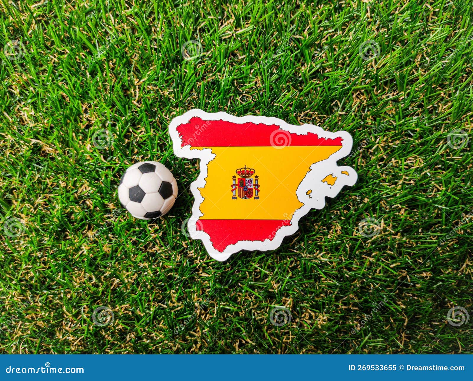 Ball and the Spain Flag Sticker is on a Green Field Stock Image - Image ...