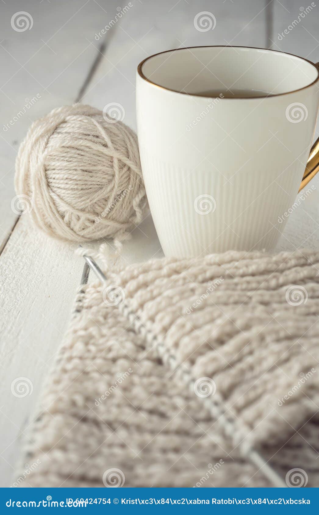 Ball of Yarn and Knitting on a Table Stock Photo - Image of creative ...