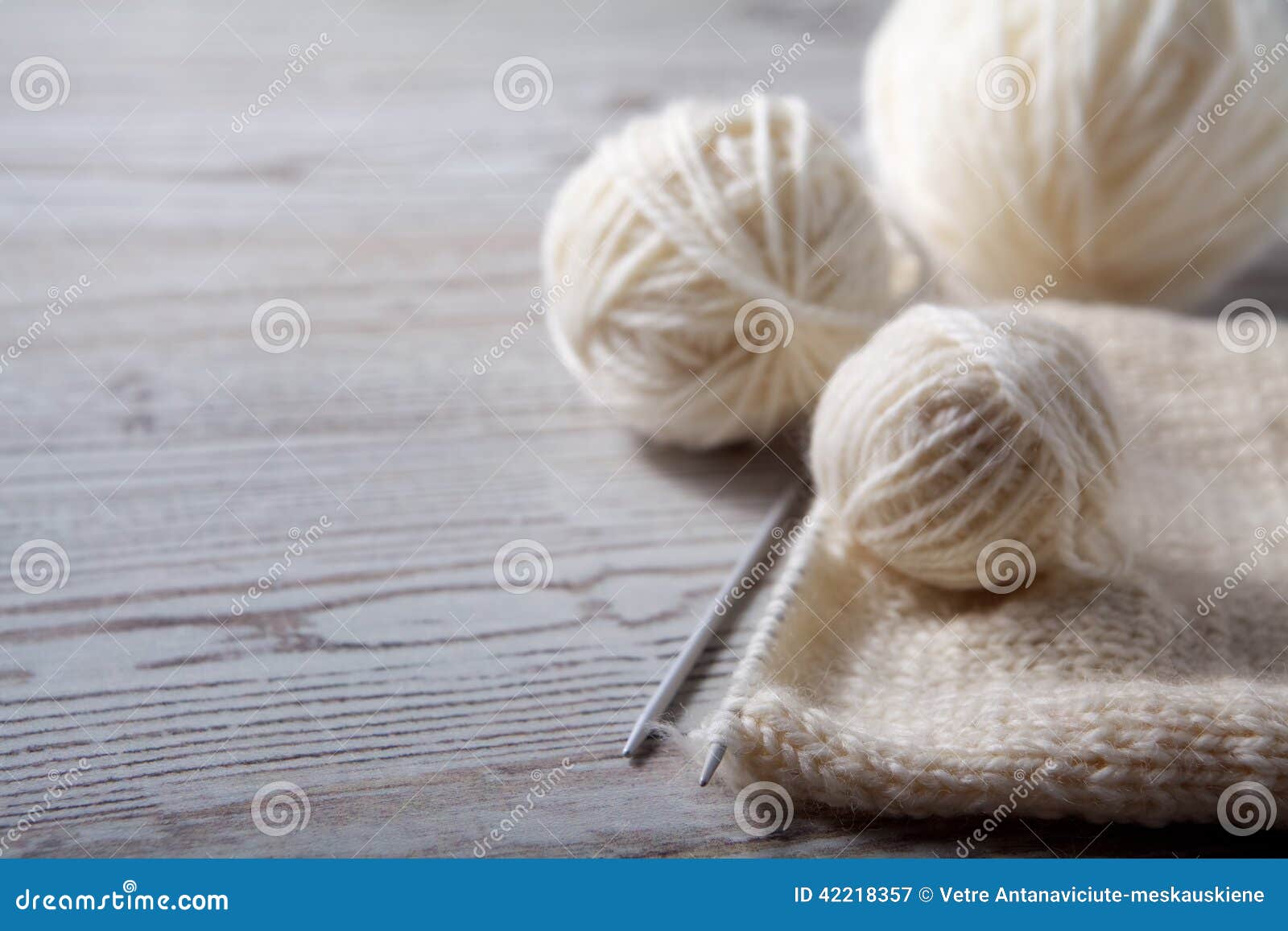 Ball of Yarn and Knitting on a Table Stock Image - Image of handmade ...