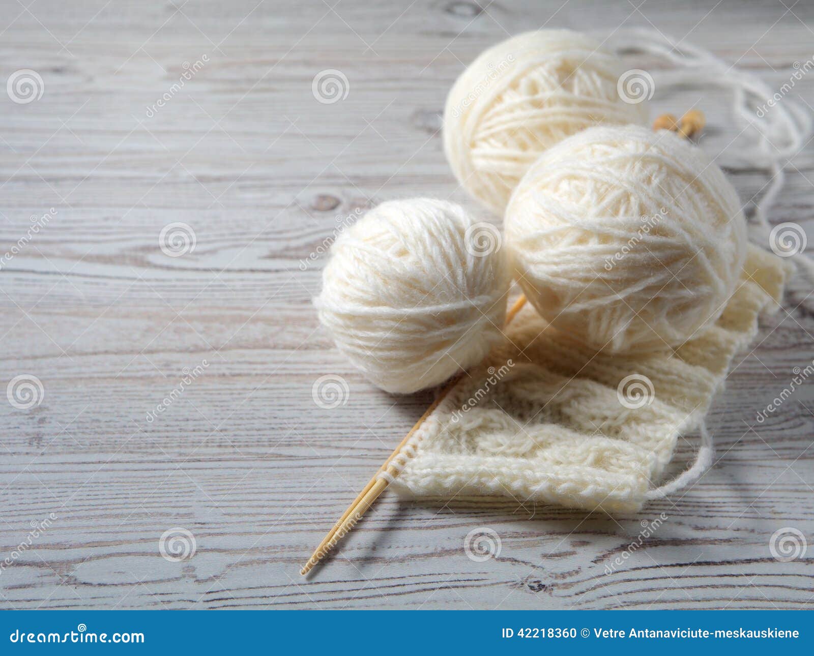 Ball of Yarn and Knitting on a Table Stock Photo - Image of color ...
