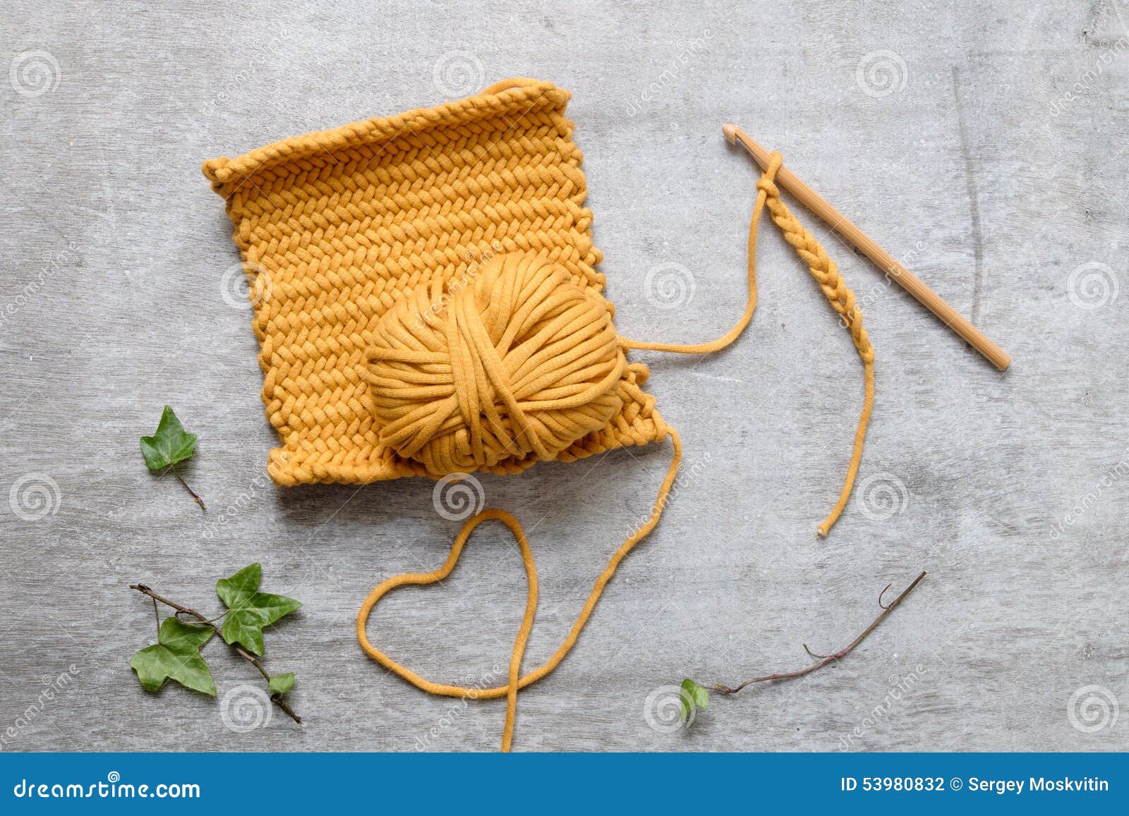 Ball of Yellow Yarn with Crochet Hook Stock Photo - Image of rustic ...