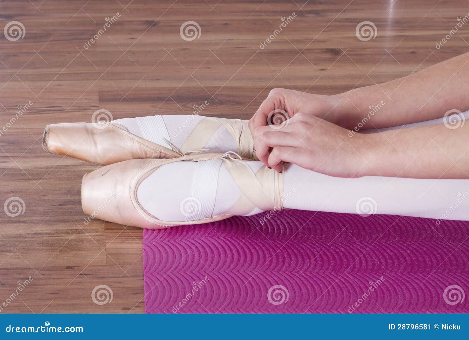 Ballerina Putting on Training Slippers Stock Image - Image of concept ...