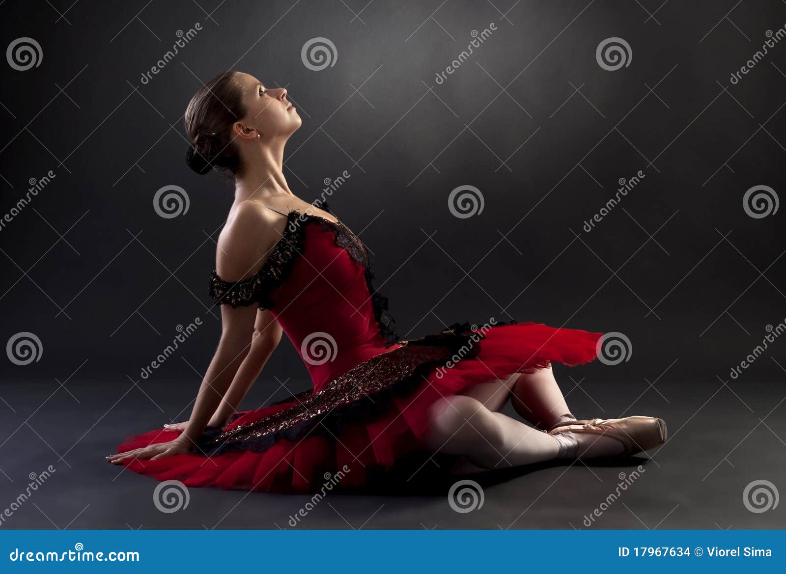 Ballerina Sitting Over Black Background Stock Photo - Image of girl ...