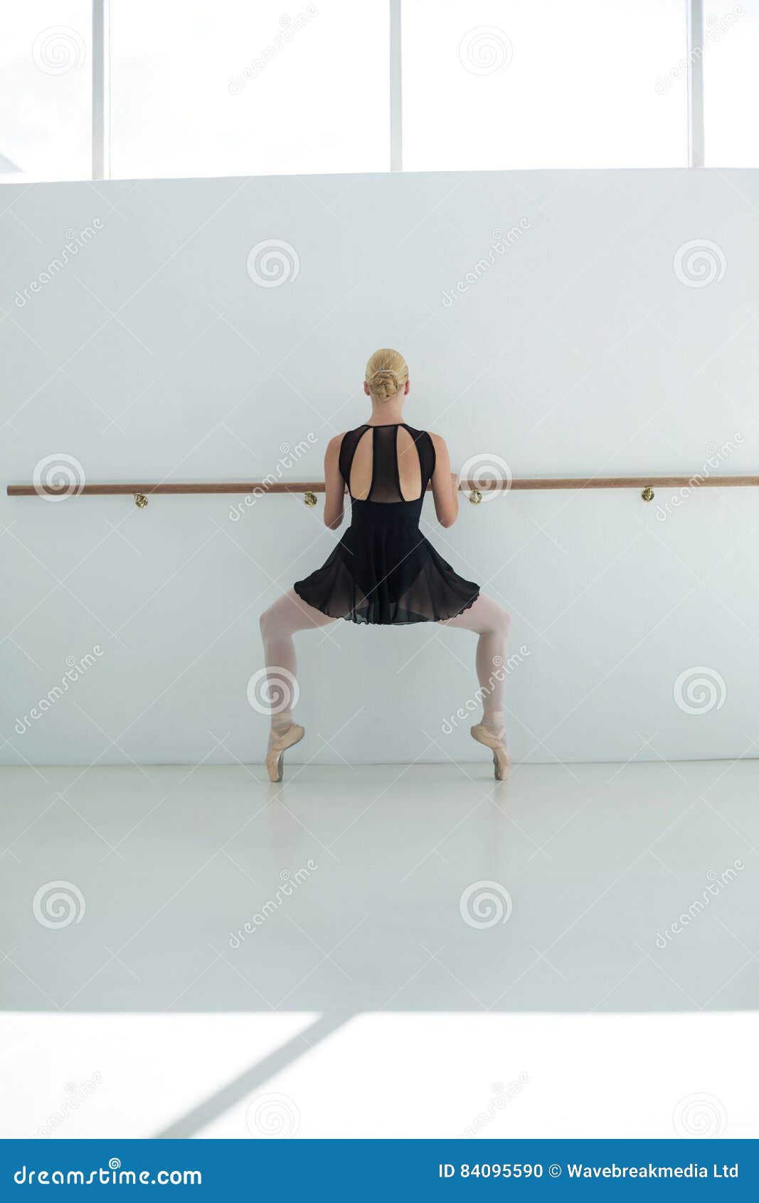 Ballerina Stretching at Barre Stock Photo - Image of skill, flexibility ...