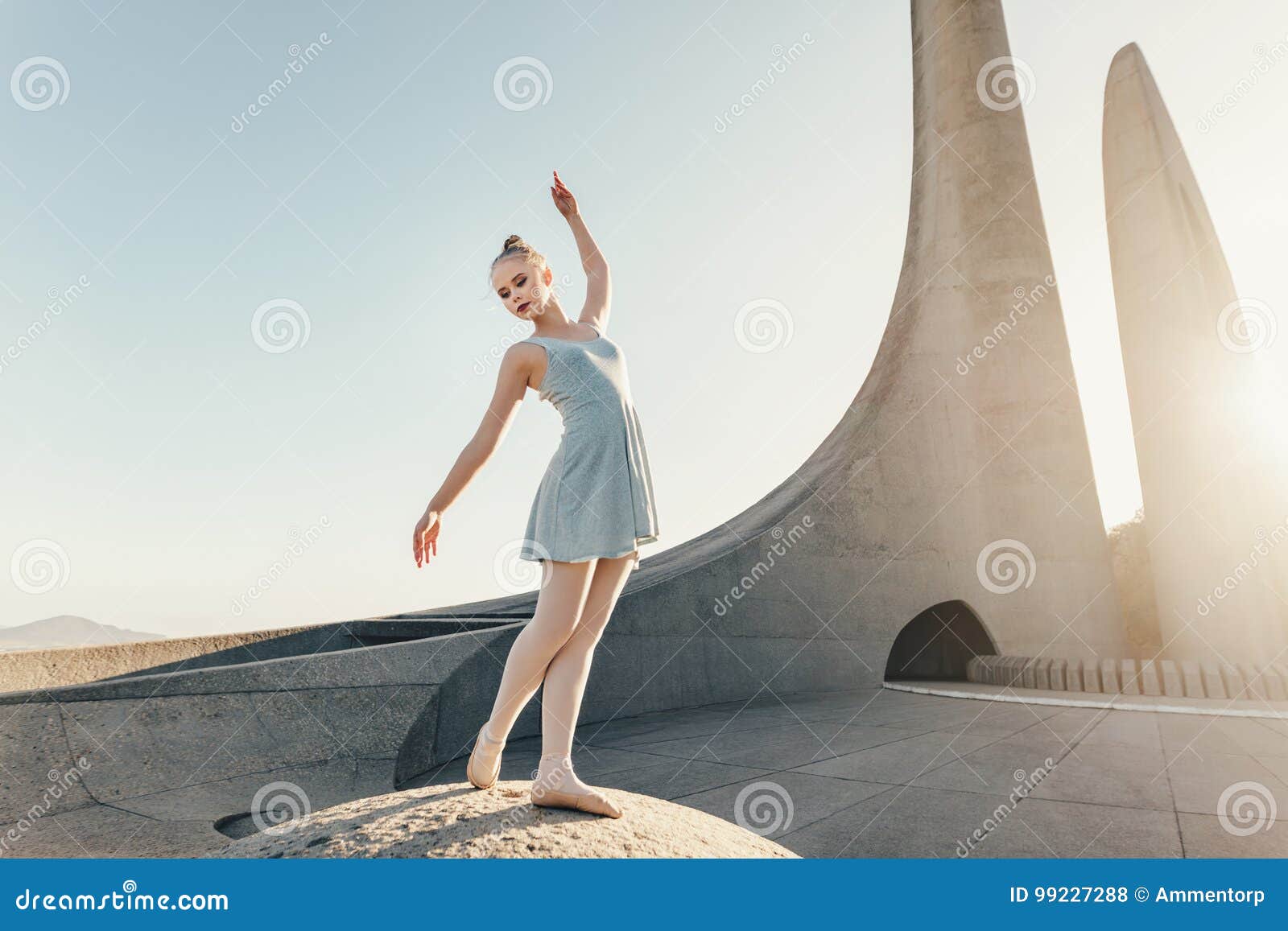 Female Ballet Dancer Practicing Dance Moves on a Rock Stock Photo ...